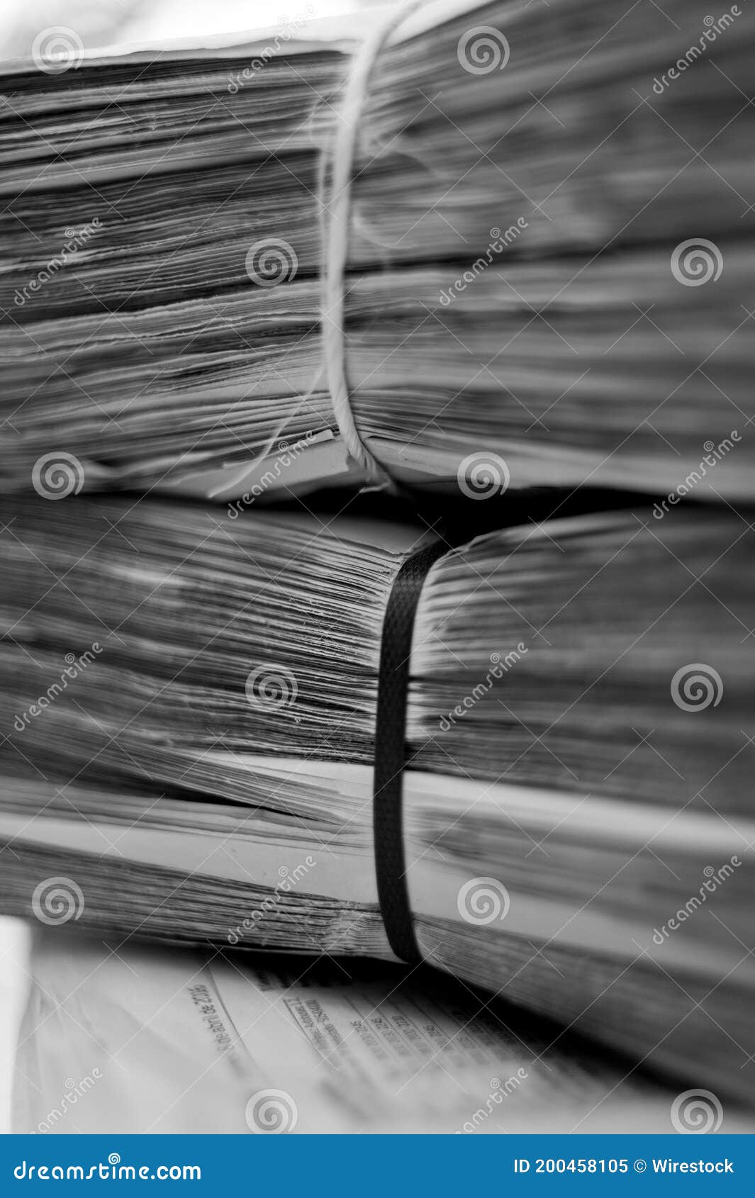 Vertical Grayscale Shot of a Stack of Paper Stock Image - Image of ...