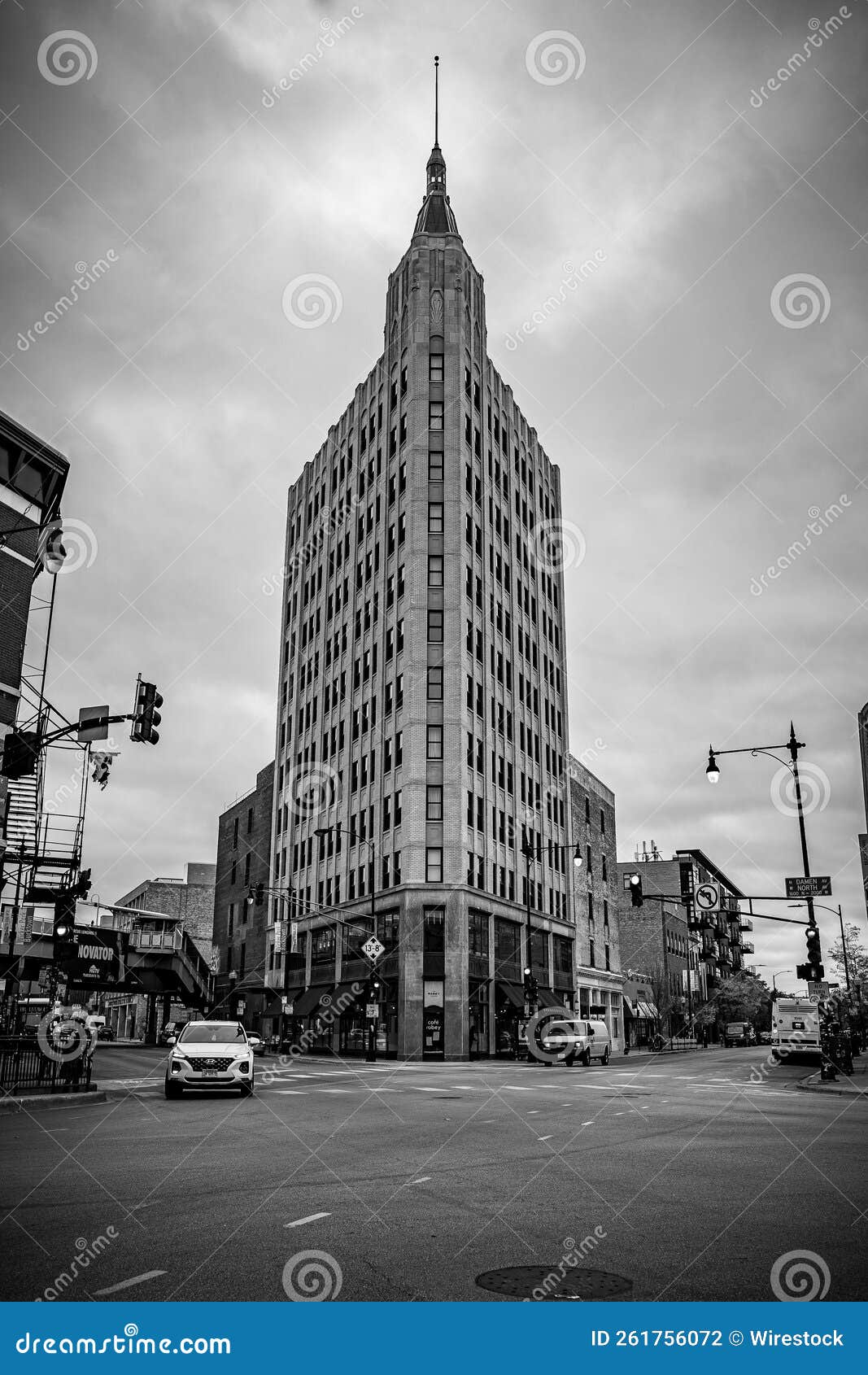 Vertical Grayscale Shot of a Street and Buildings Under the Cloudy Sky ...
