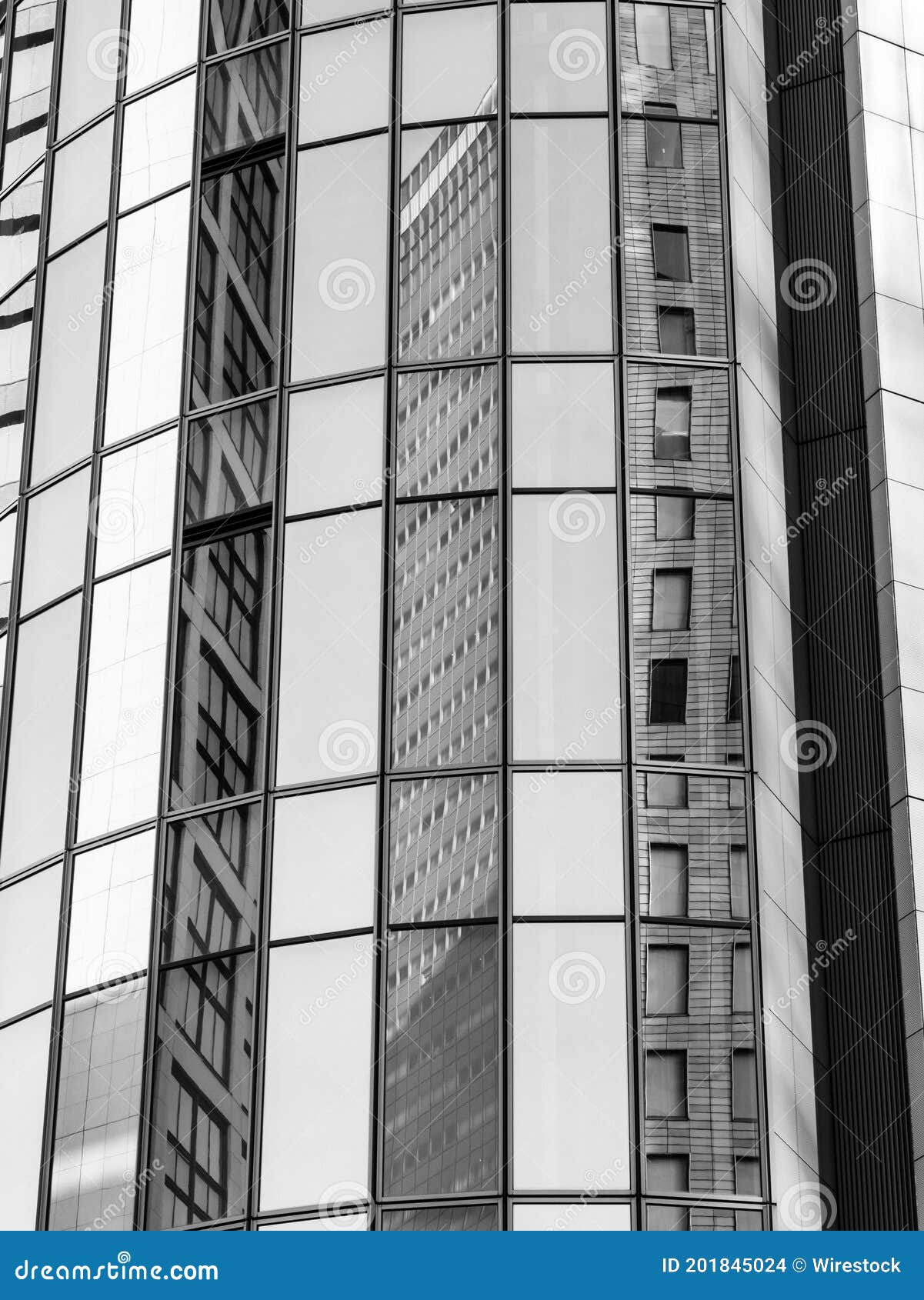 Vertical Greyscale Facade of a Modern Office Building with Glass ...
