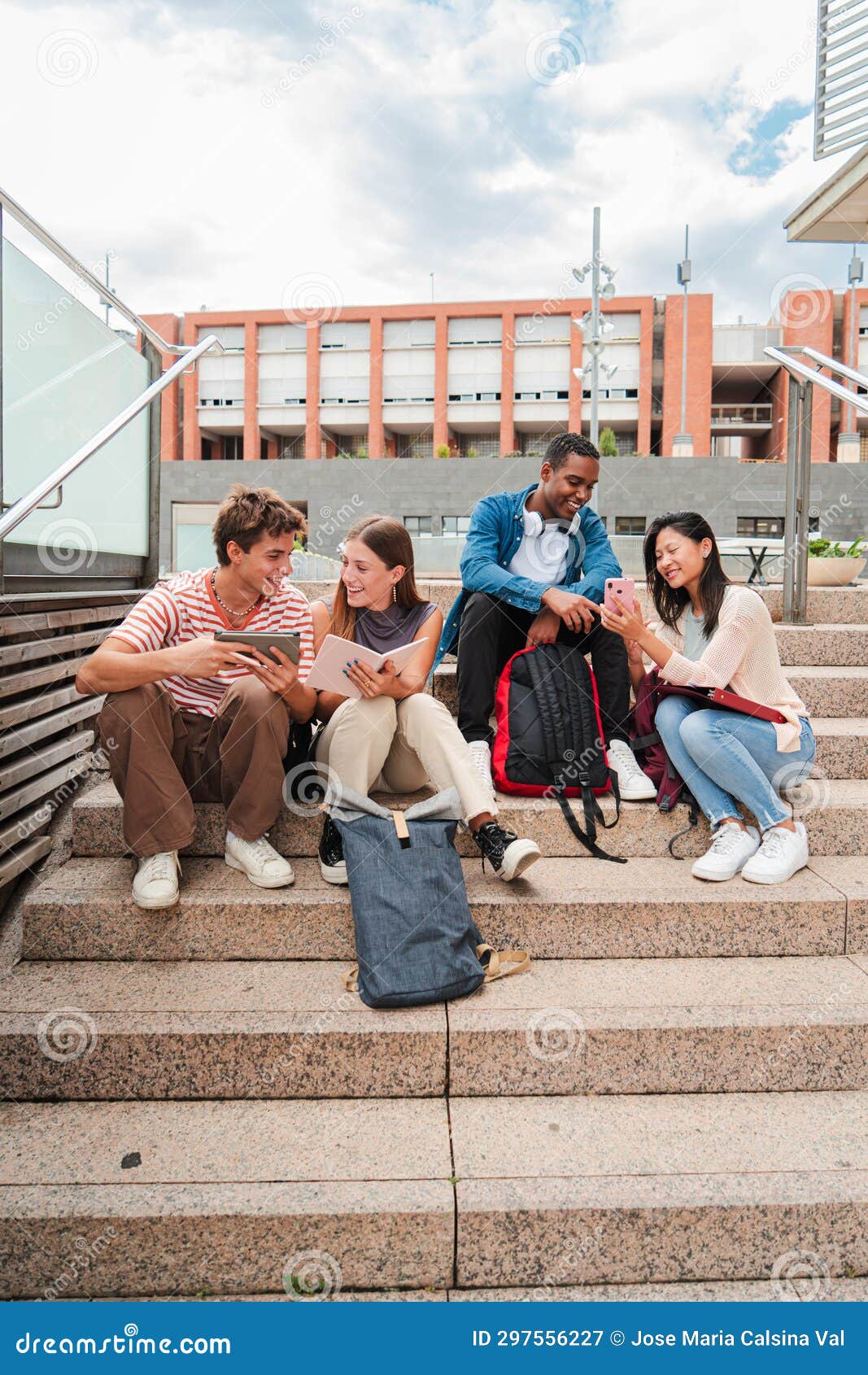 Vertical. Group of Multiracial High School Students Talking on a ...