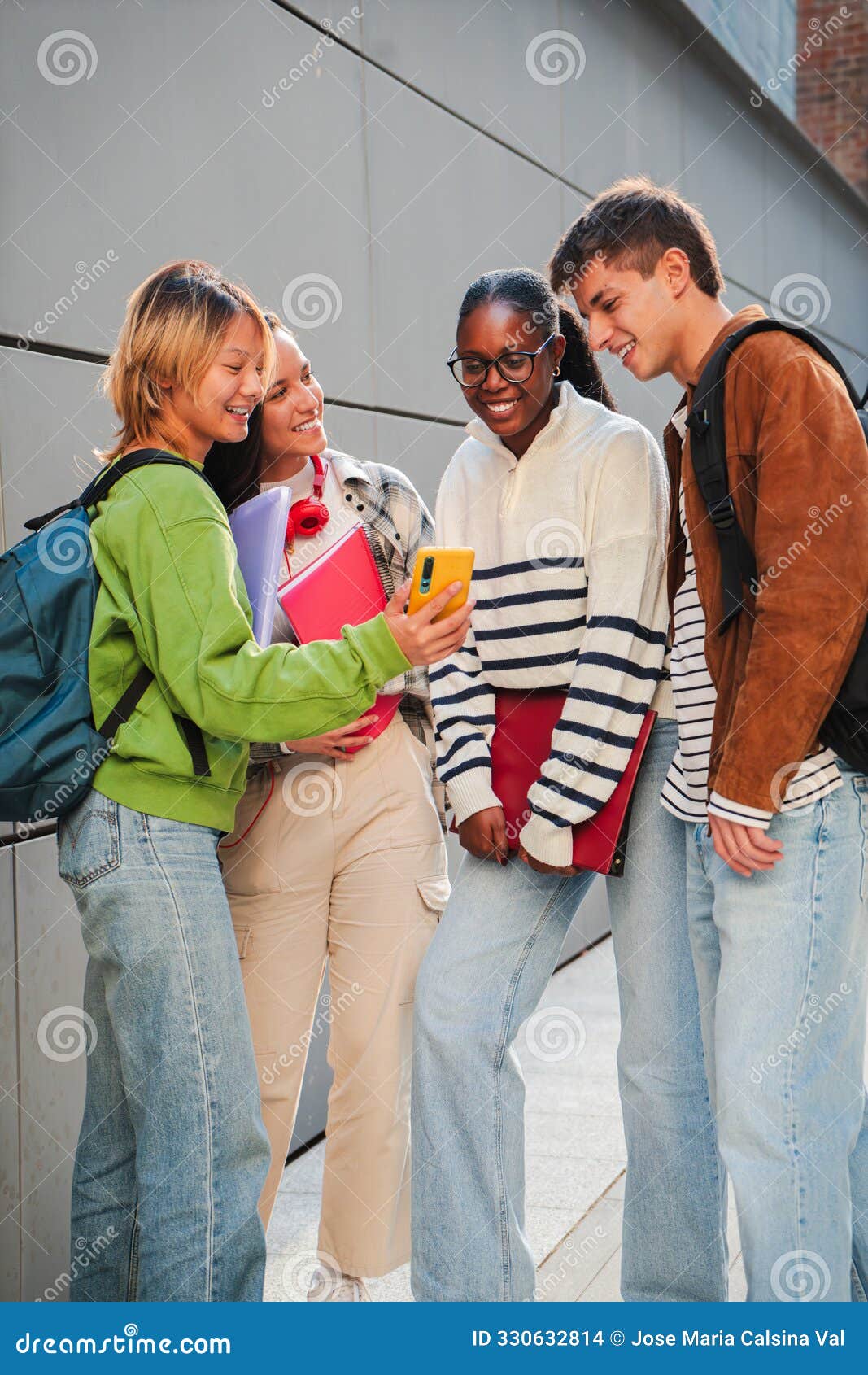 Vertical Group of Teenage Students Talking on the University Campus ...