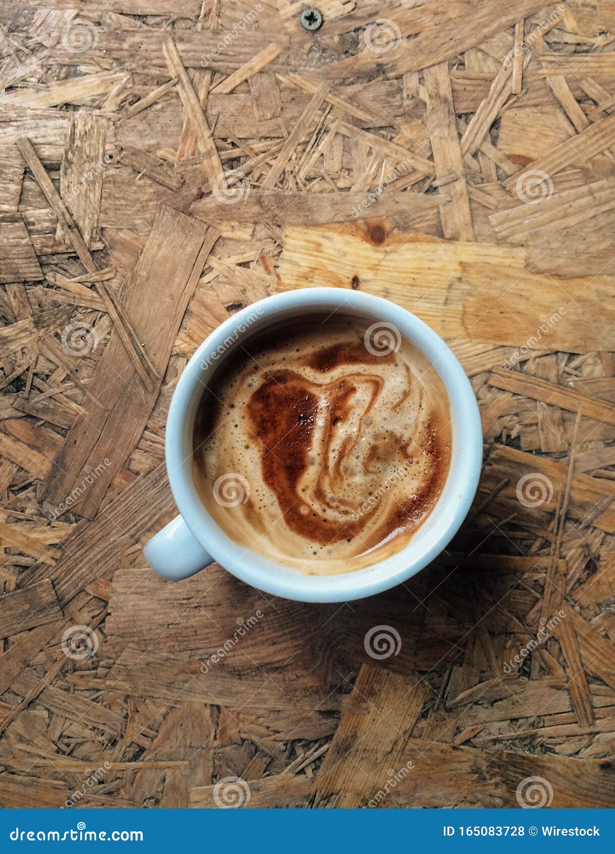 Vertical High Angle Closeup Shot of Espresso Coffee in a White Ceramic ...