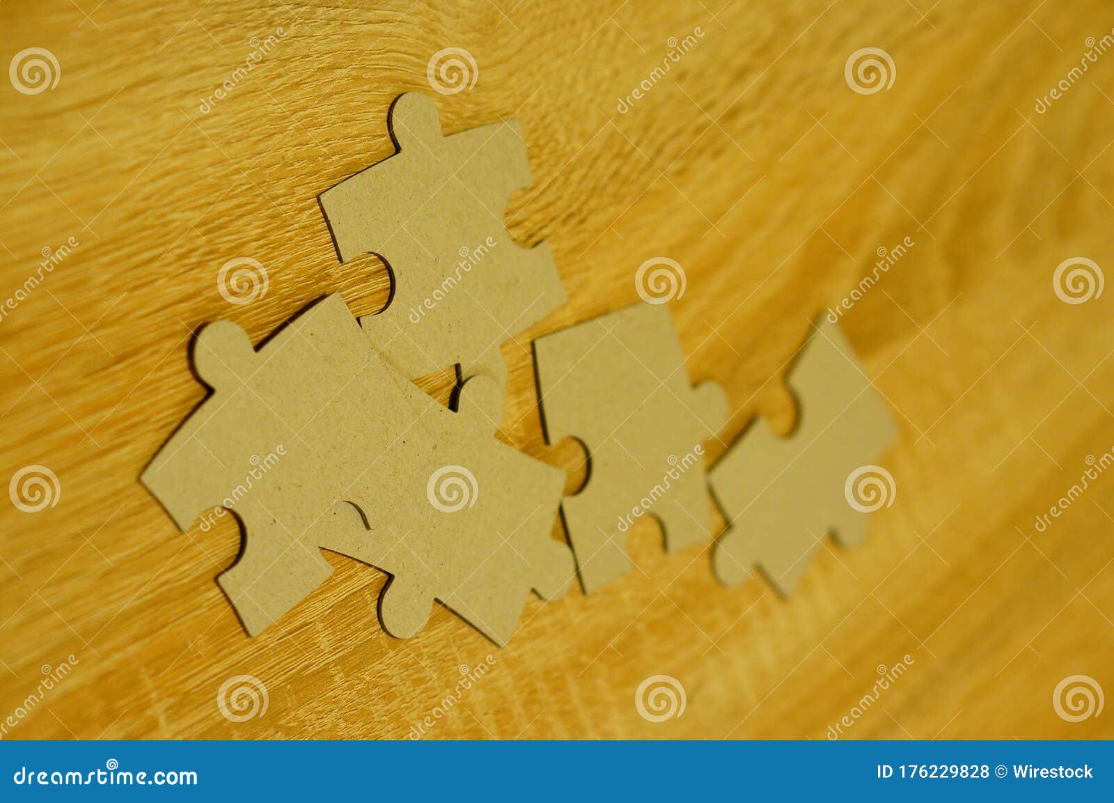 Vertical High Angle Closeup Shot of Puzzle Pieces on a Wooden Surface ...