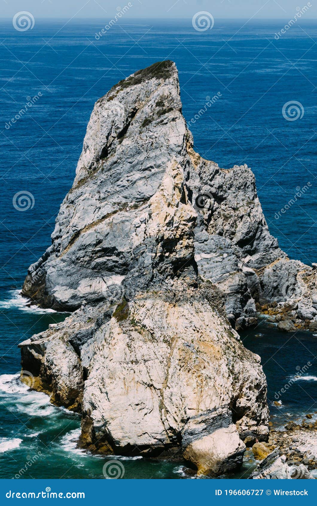 Vertical High Angle Shot of Big Rock Formations in the Sea Stock Image ...