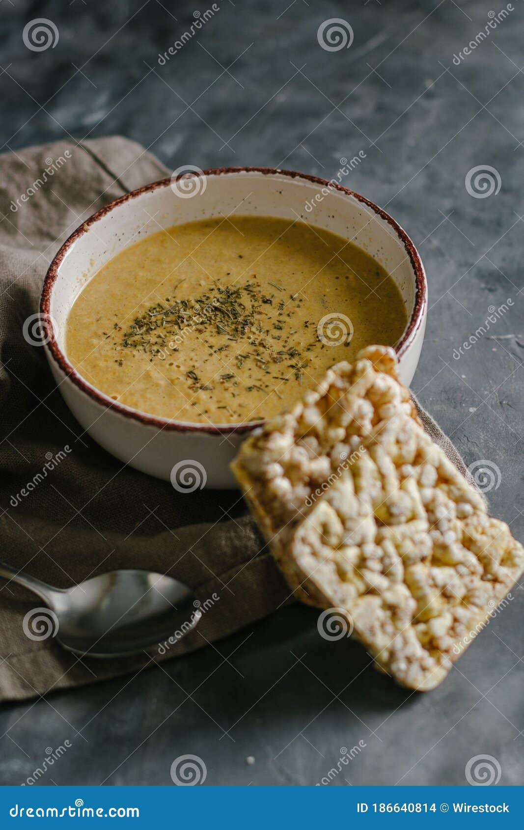 Vertical High Angle Shot of a Bowl of Soup with Crackers on the Side ...