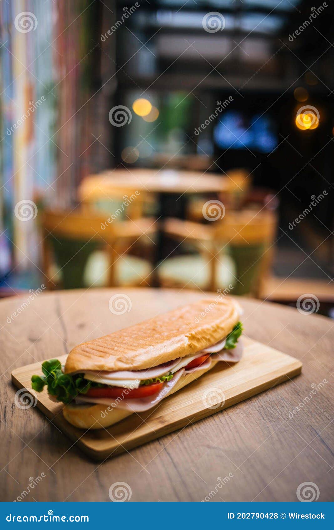 Vertical High Angle Shot of a Delicious-looking Sandwich in a Cafe ...