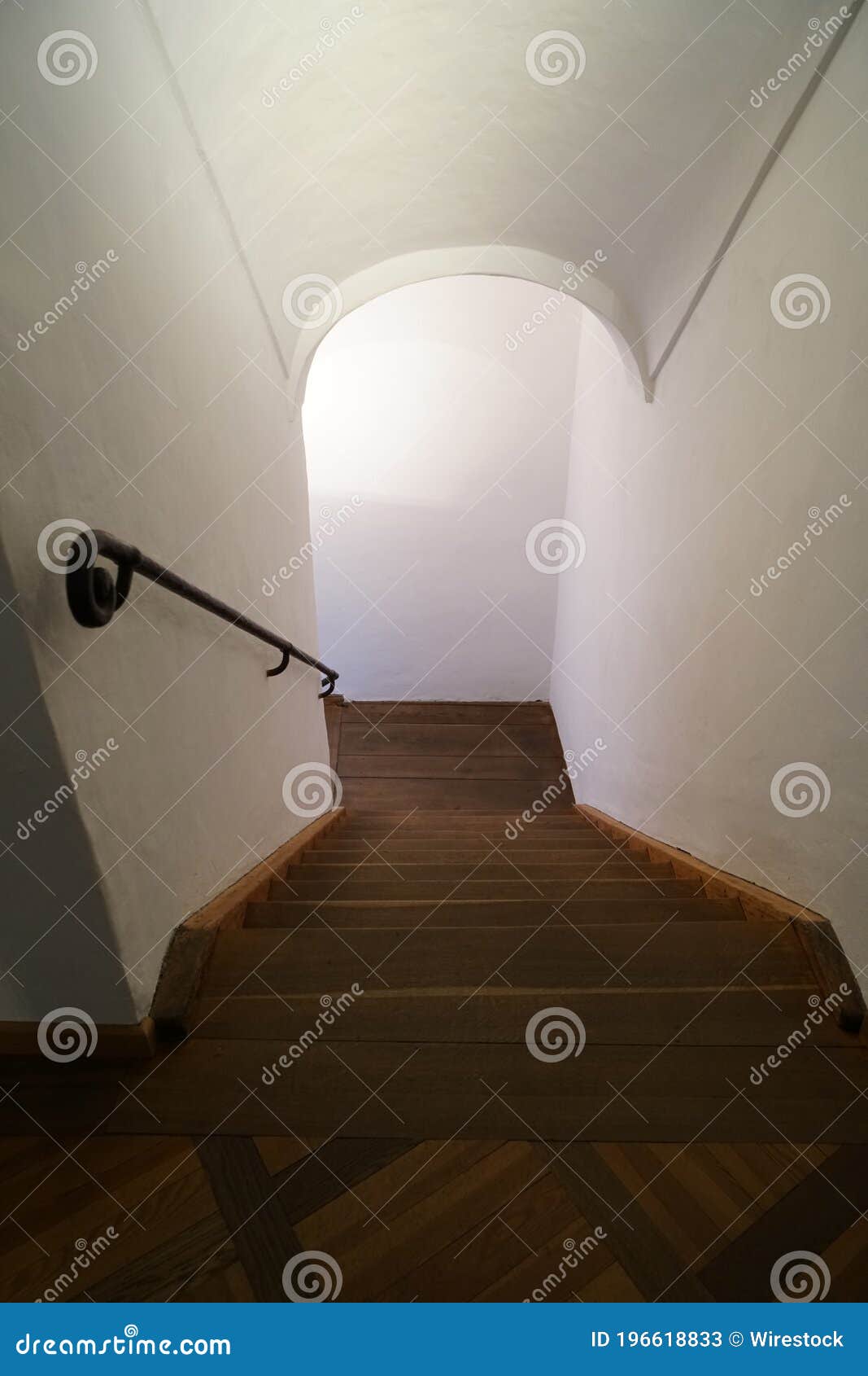 Vertical High-angle Shot of a Descending Staircase with Parquet ...