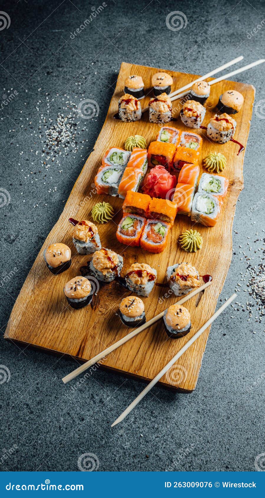 Vertical High-angle Shot of Different Types of Sushi Rolls with ...