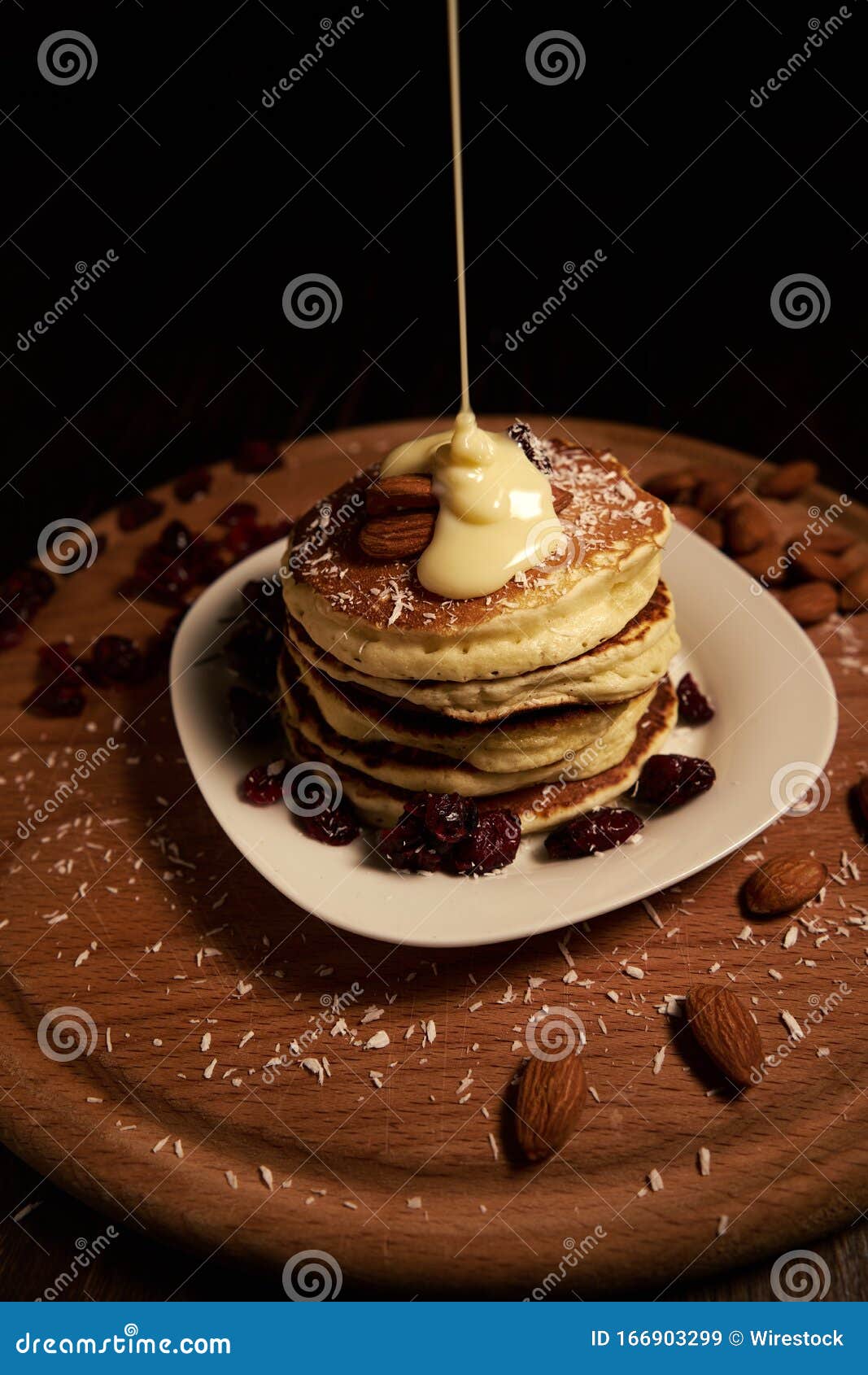 Vertical High Angle Shot of a Stack of Pancakes with Raisins and ...