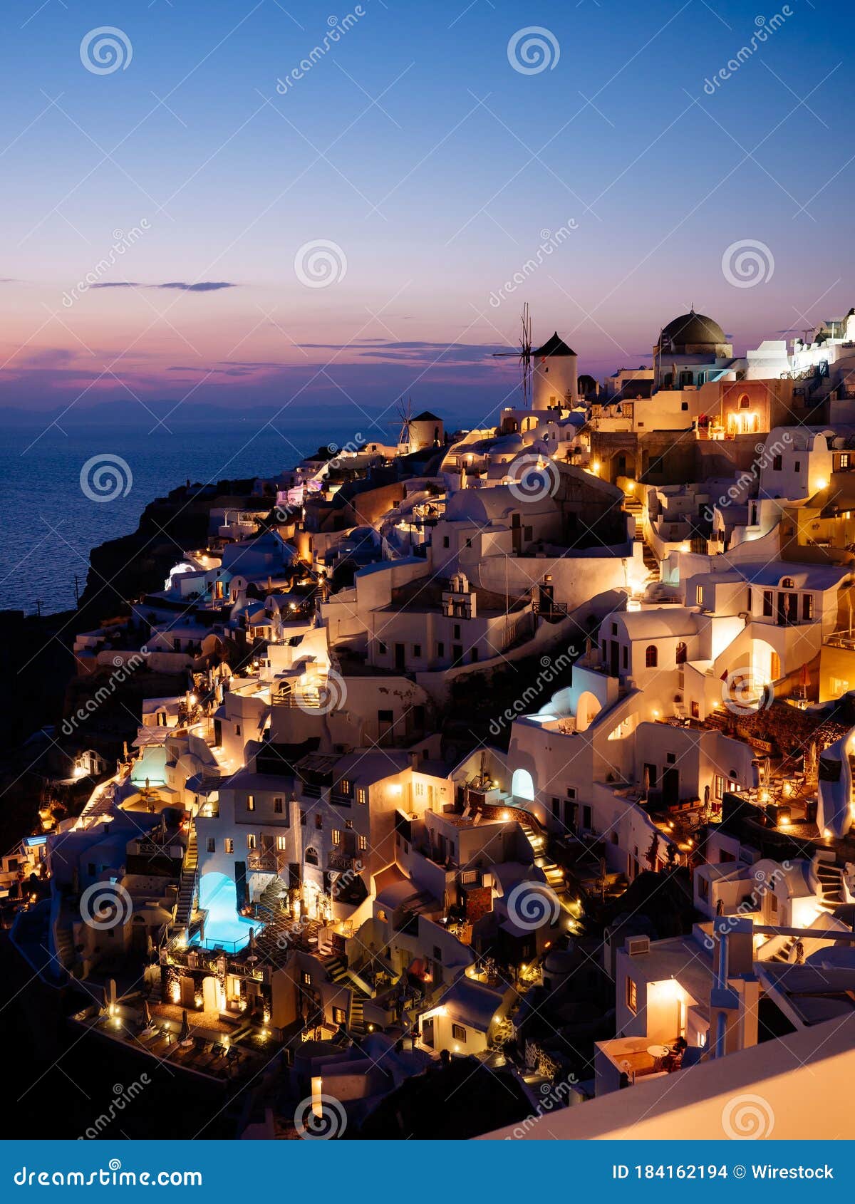Vertical High Angle Shot of the White Buildings in Santorini, Greece ...