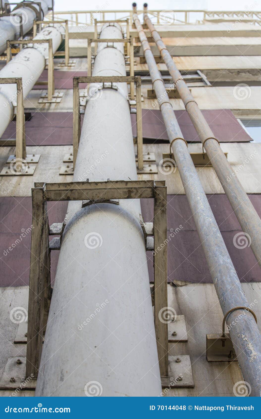 Vertical Hotel Building Pipes on the Wall Stock Photo - Image of water ...