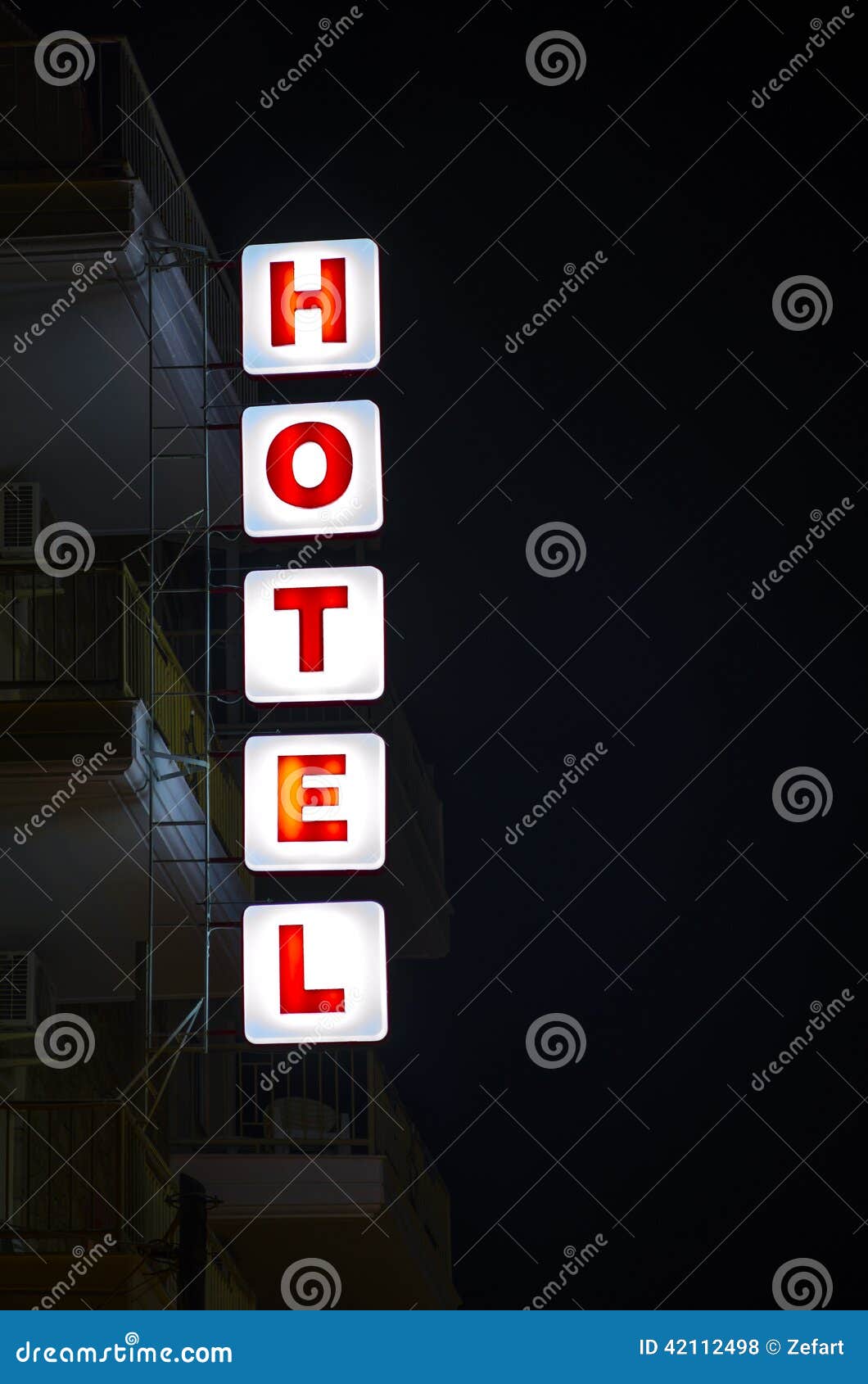 Vertical Hotel Sign at Night Stock Photo - Image of hotel, balcony ...