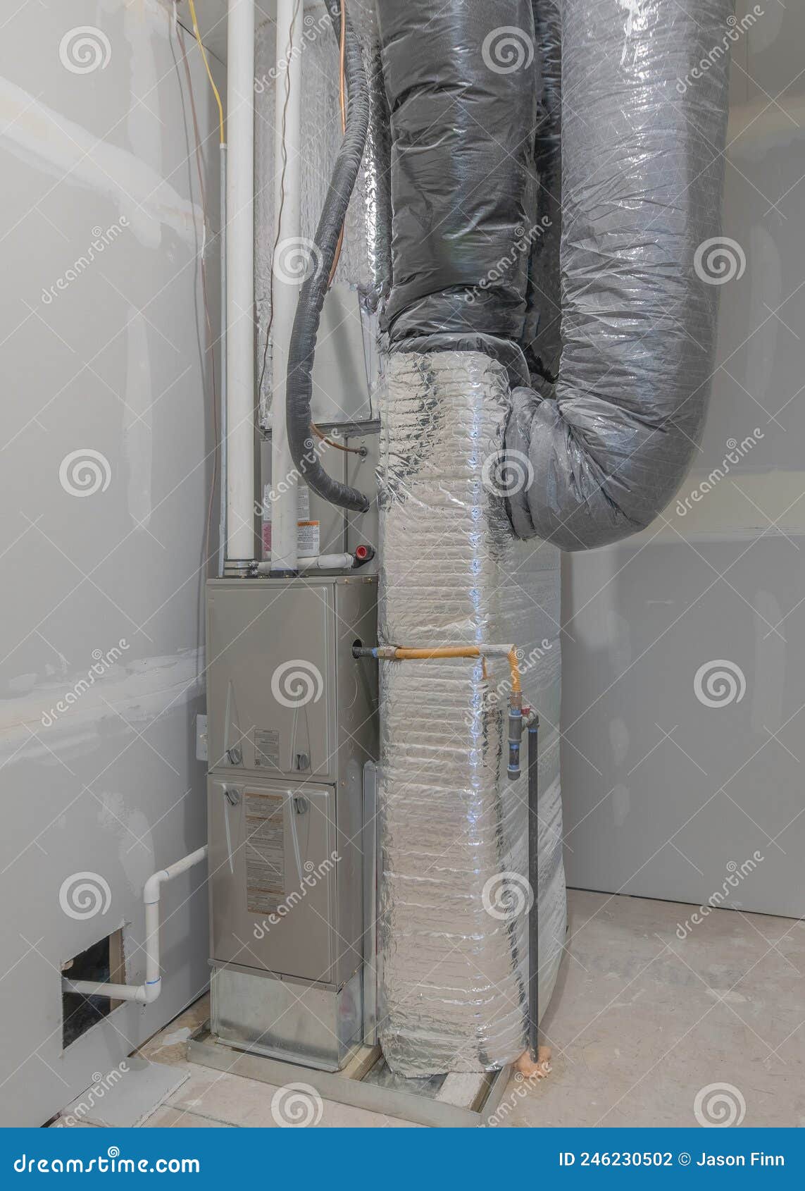 Vertical HVAC System Inside a Utility Closet Room with White Markings ...