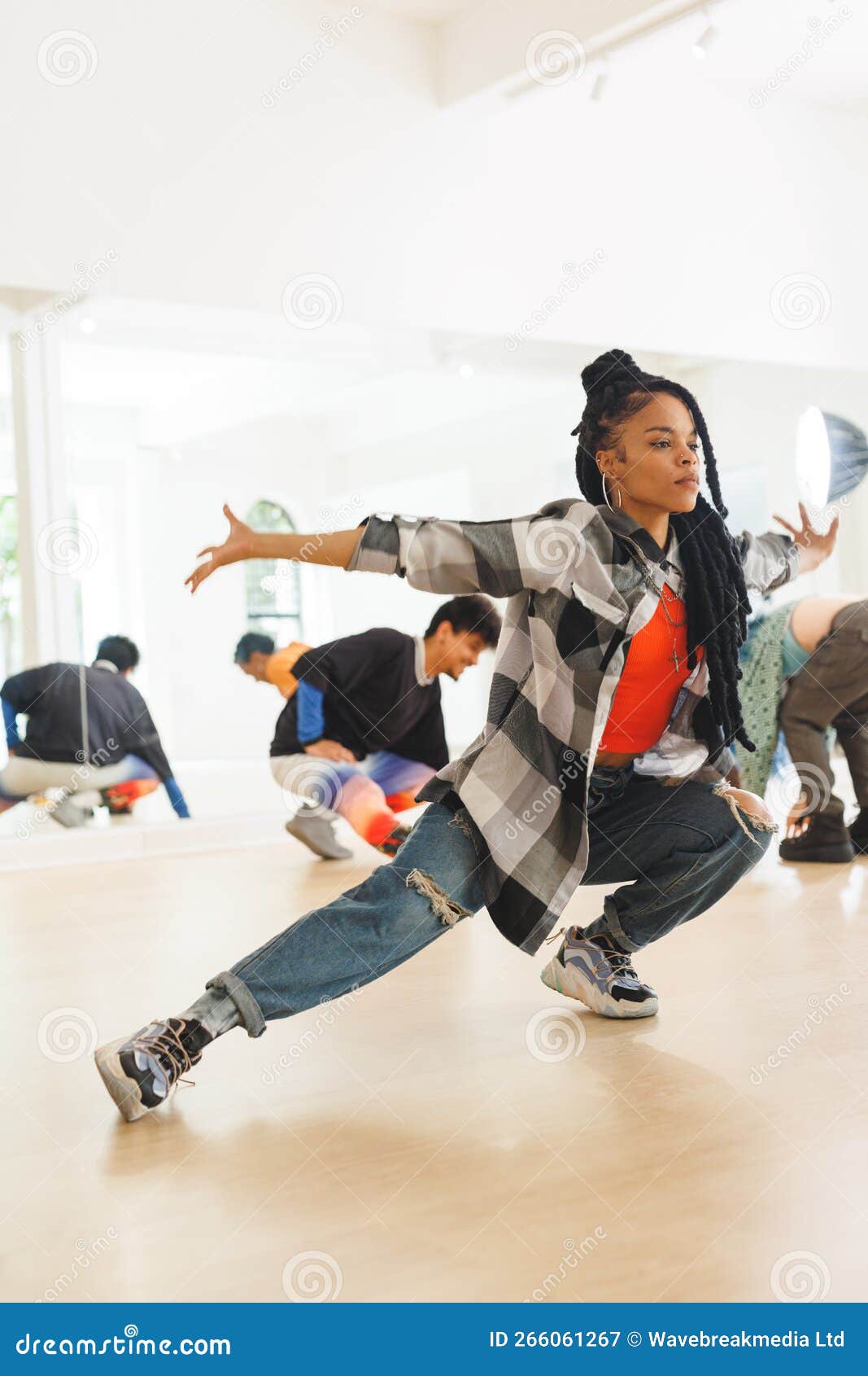Vertical Image of African American Female Hip Hop Dancer Practicing at ...