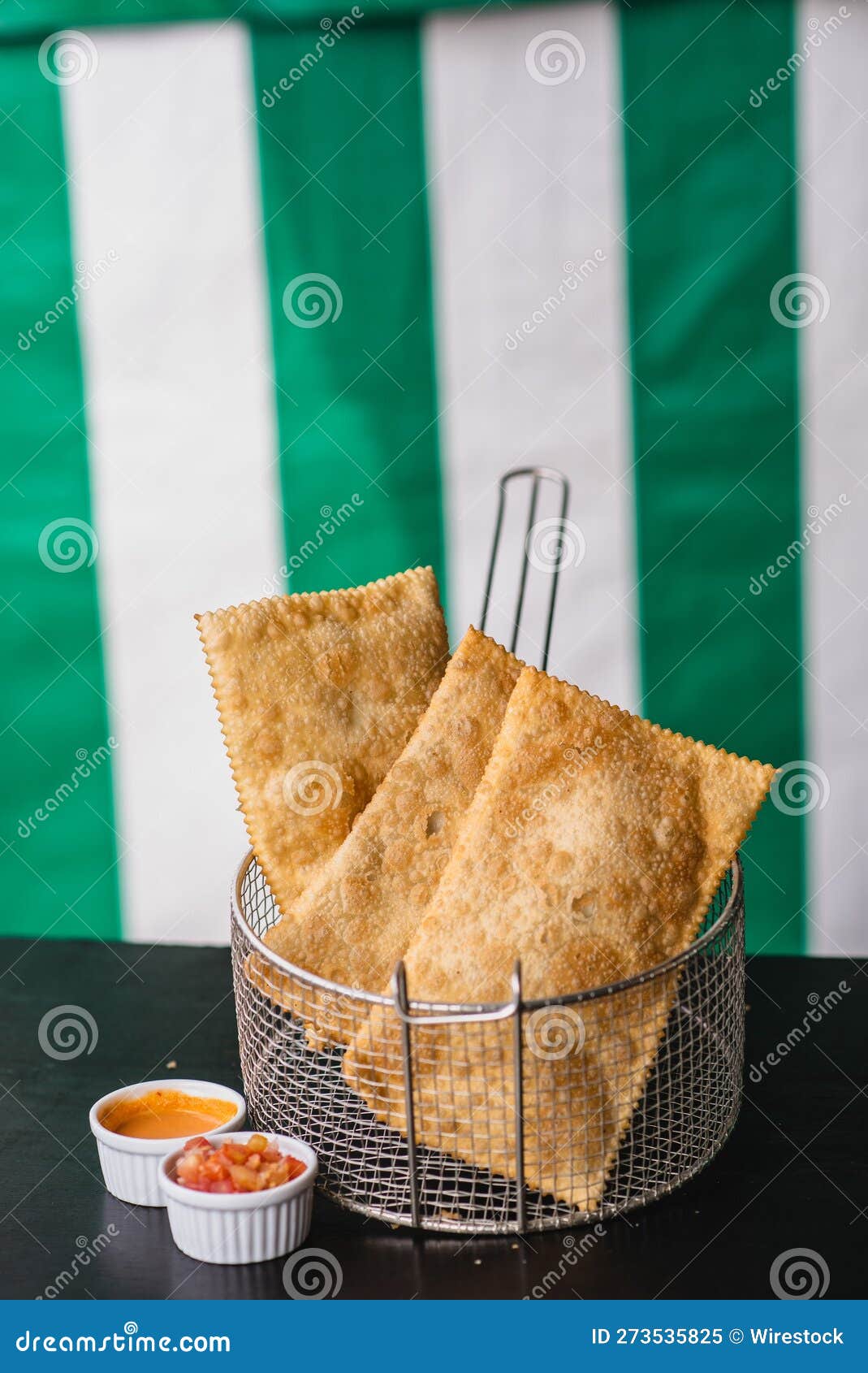 Vertical Image Featuring a Traditional Brazilian Snack Called Pastel ...