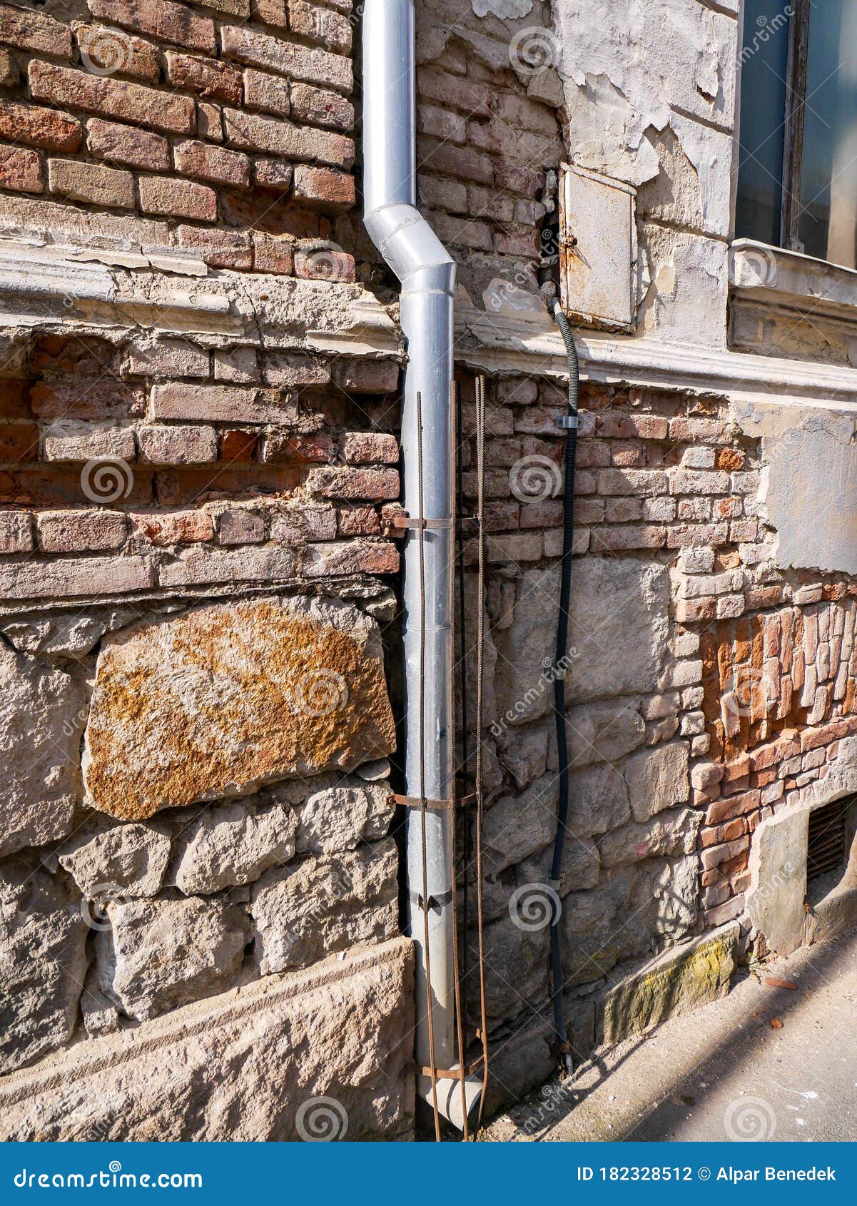 Vertical Image ,gutter on Old Weathered Brick Wall Stock Photo - Image ...