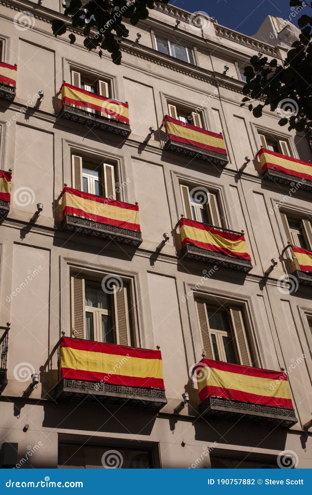 Madrid balcony flags stock photo. Image of apartment - 190757882
