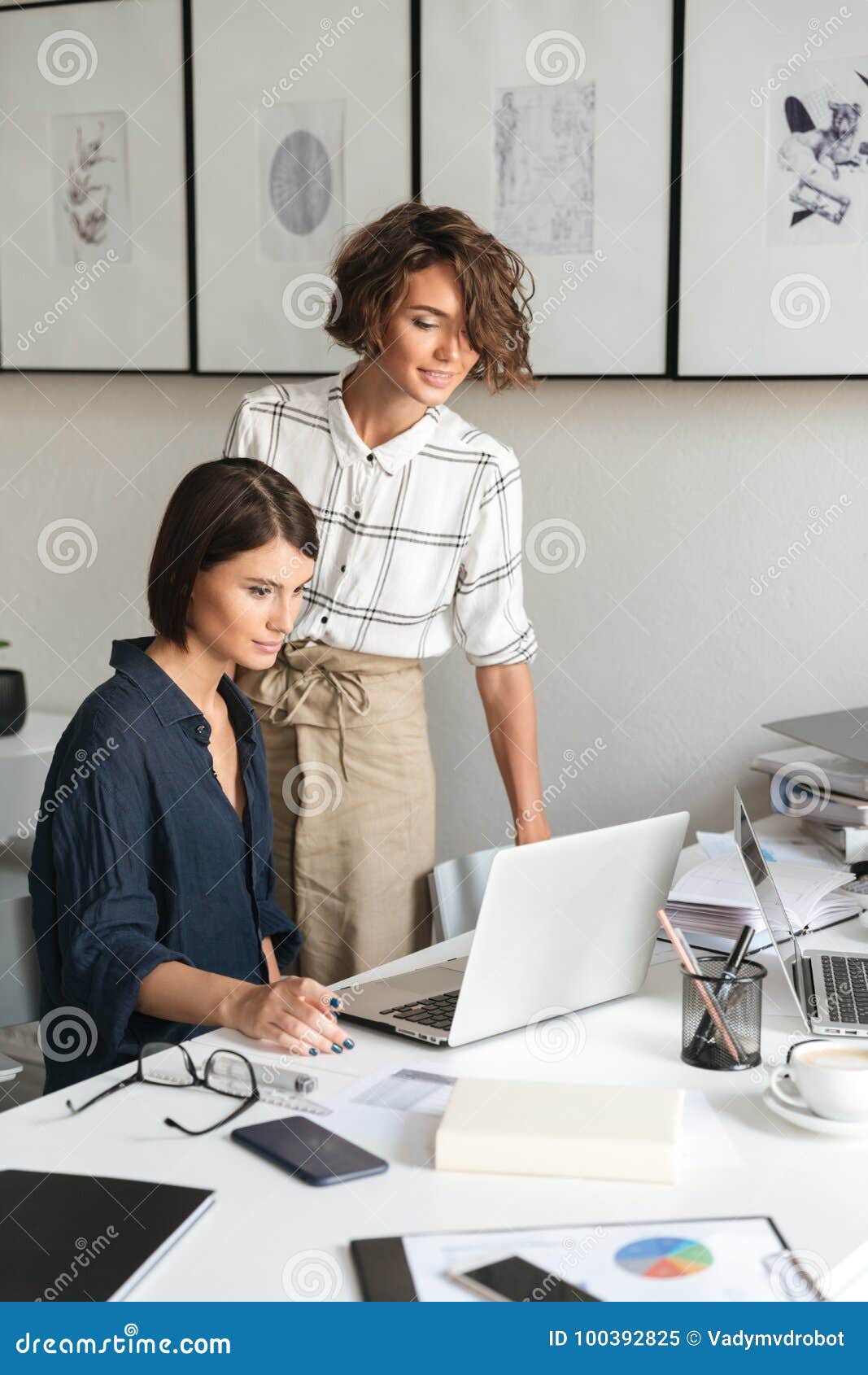 Vertical Image of Two Women are Discussing Something Stock Image ...