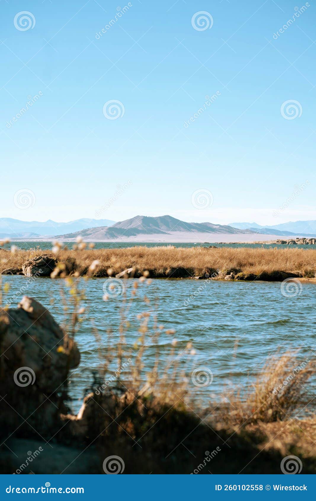 Vertical of a Lake and Mountains in the Distance. Stock Photo - Image ...