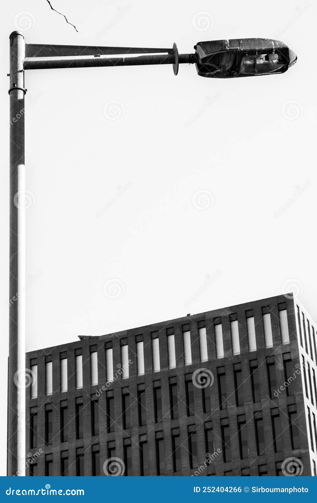 Original and Minimal Lamp Post Forming an Inverted L Shape Pointing at ...