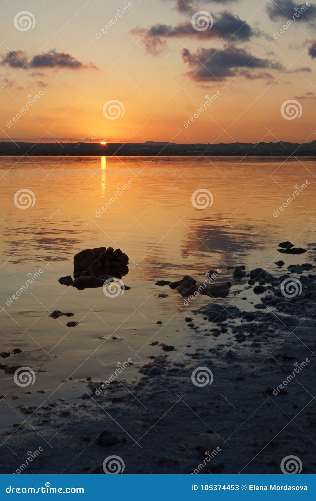 Vertical Landscape on the Lake at Sunset Stock Image - Image of ripples ...
