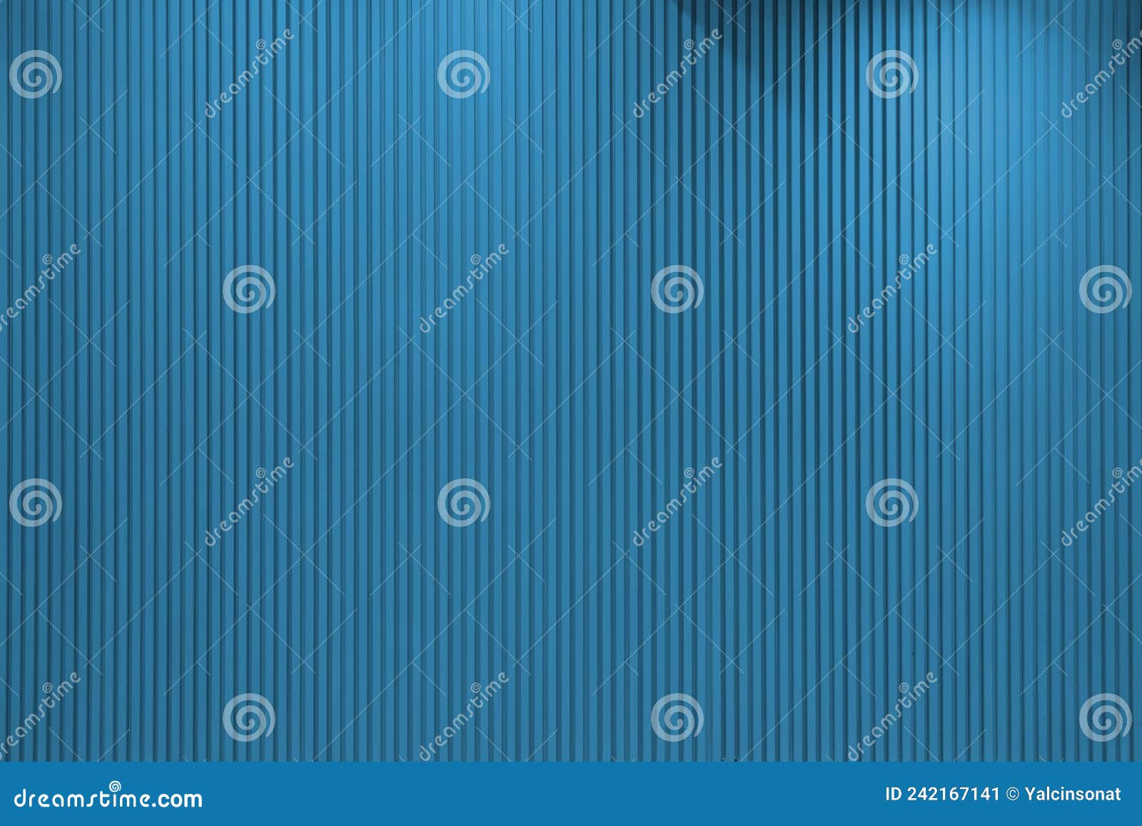 Vertical Line Textured Blue Wall with Lights Hitting it from Different ...