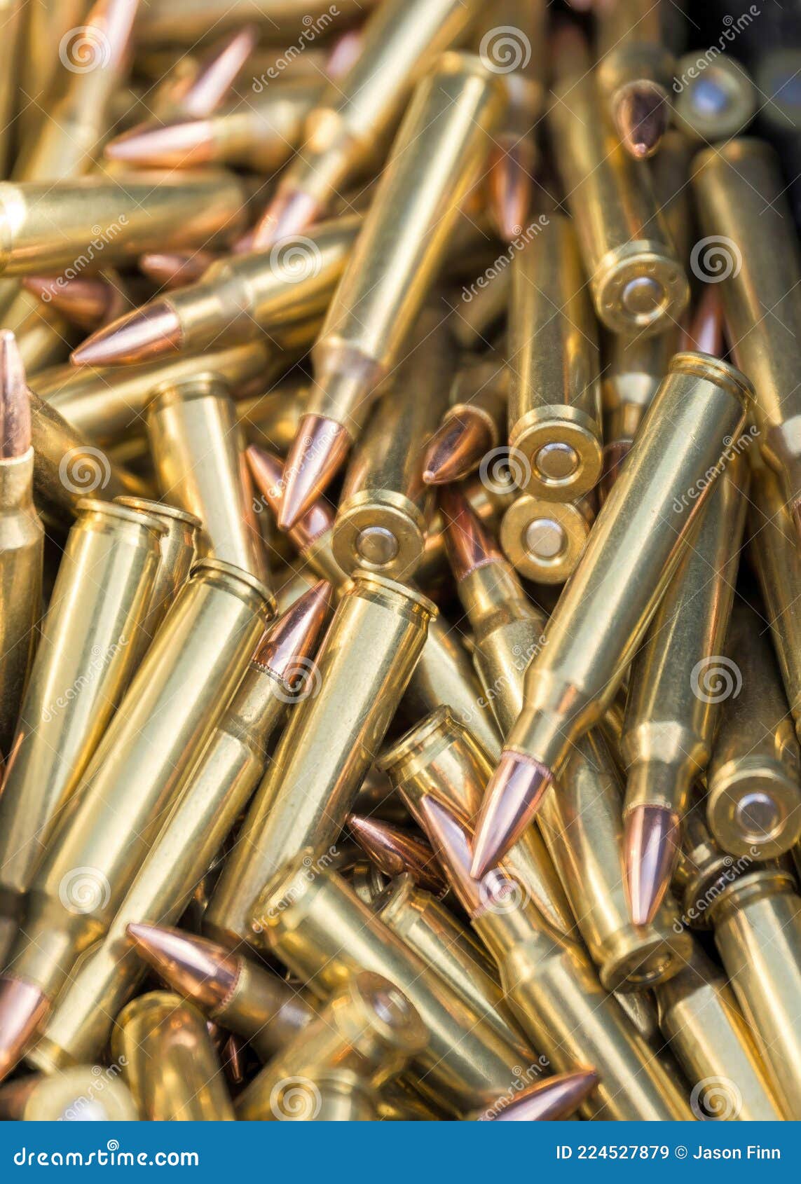 Vertical Loads of Long Sharp Bullets Inside Its Case with a Blue Cloth ...