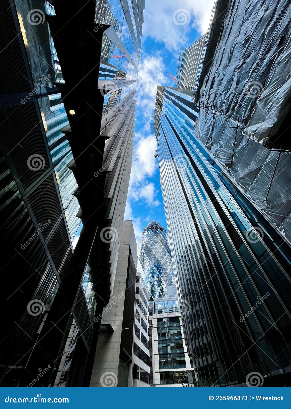 Vertical Low Angle of Modern High-rising Buildings with Clouds in the ...