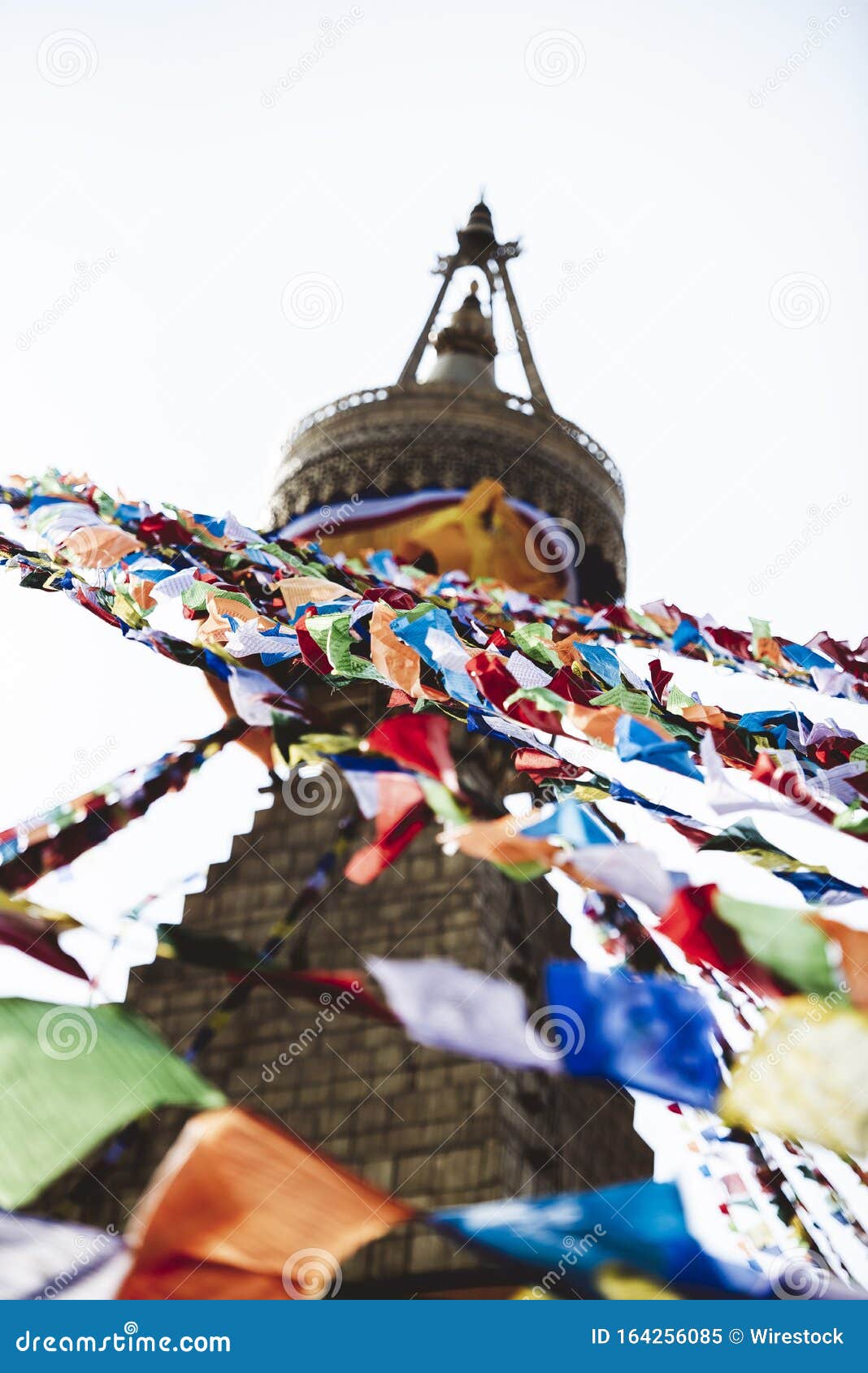 Vertical Low Angle Shot of Cloth Attached To a String at a Temple in ...
