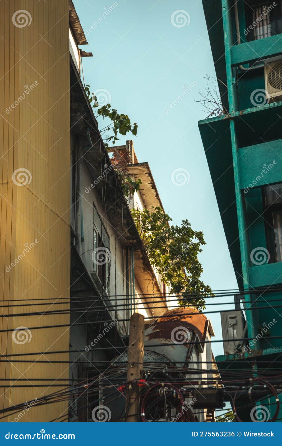 Vertical Low Angle Shot of Rusty Old Buildings in Bangkok, Thailand ...