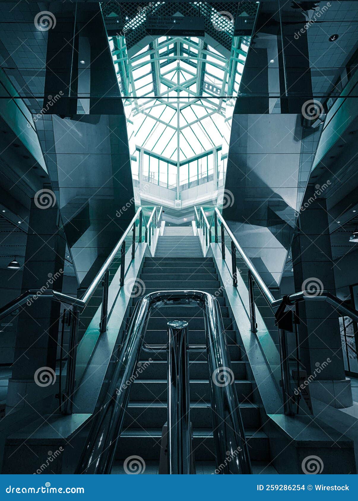 Vertical Low Angle Shot of a Stairway in a Modern Building with Window ...