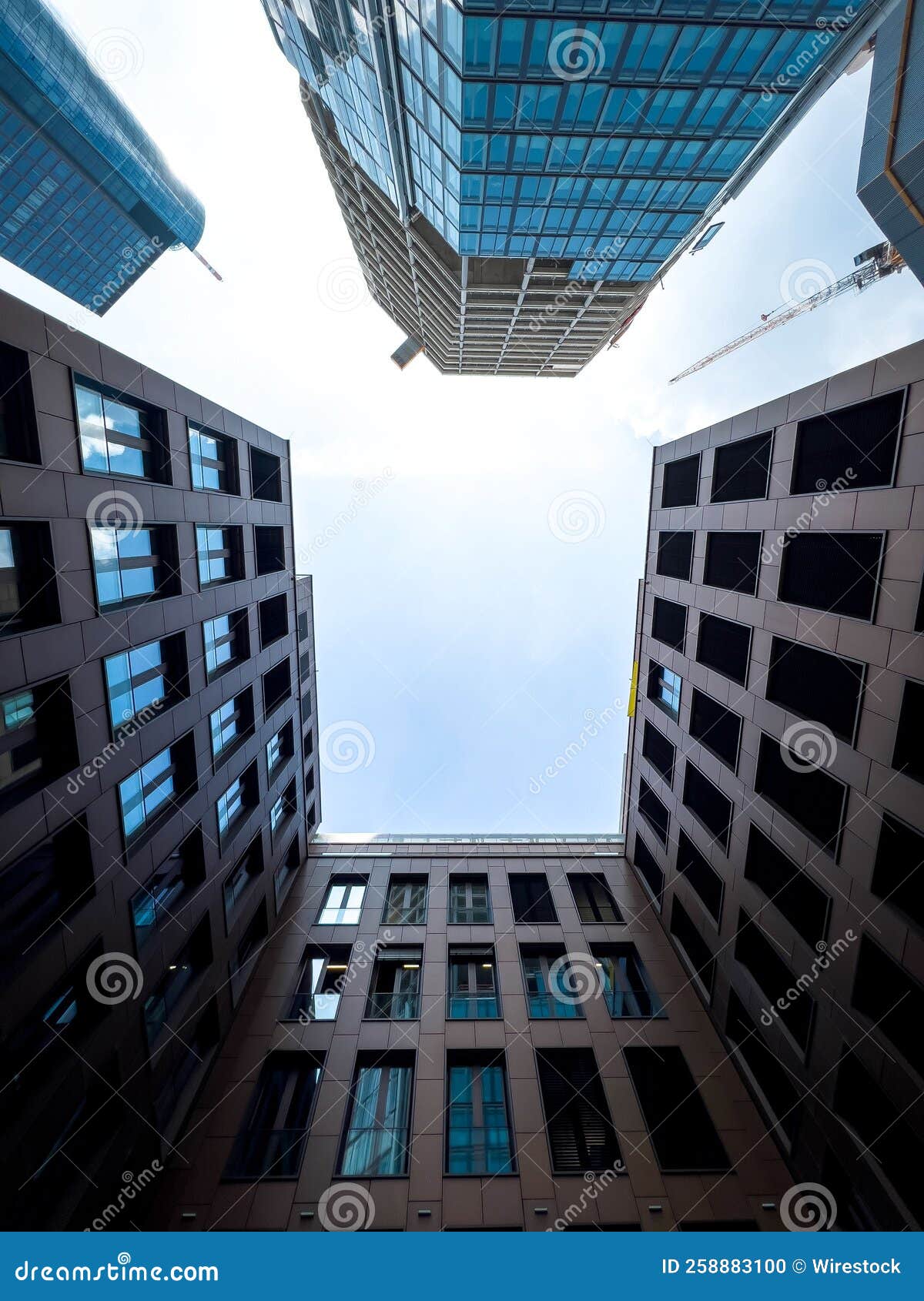 Vertical Low-angle Shot of Tall Buildings with an Empty Space for the ...