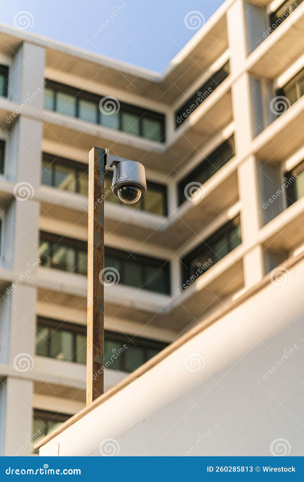Vertical Low-angle View of a Security Camera Column by a Residential ...