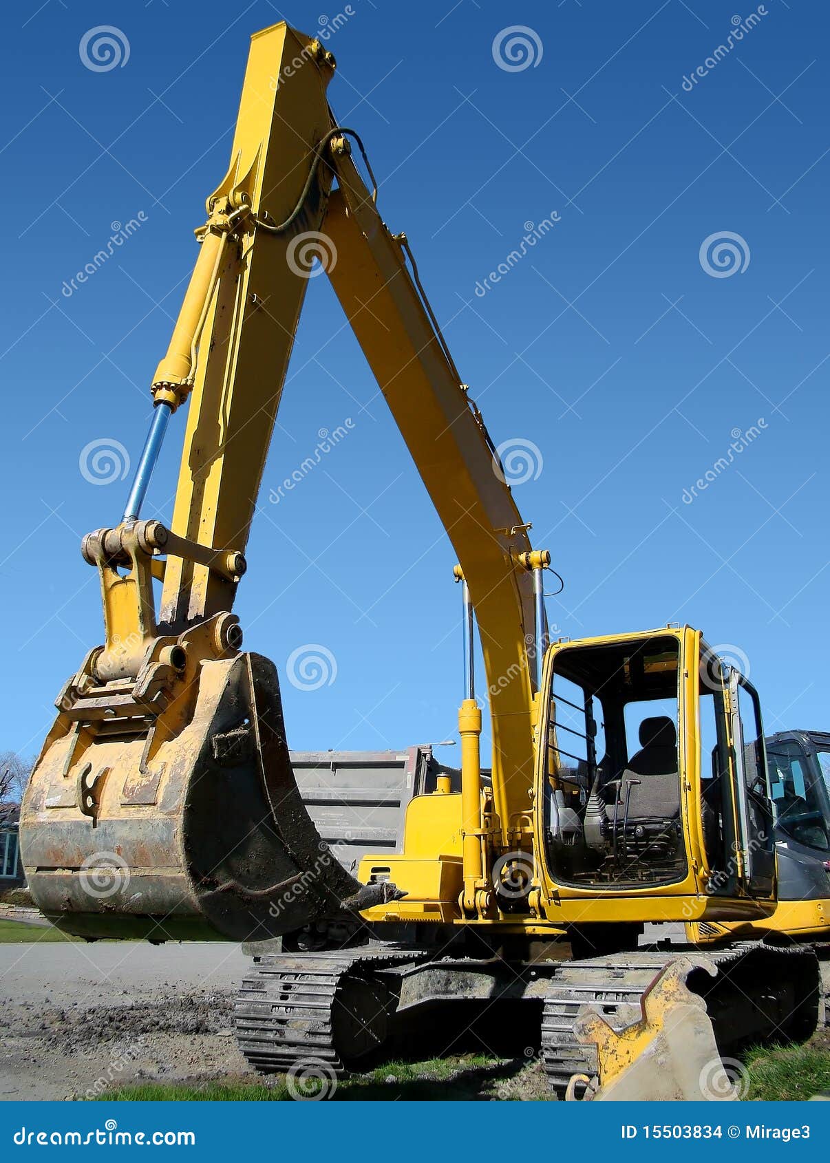 Vertical mechanical digger stock photo. Image of street - 15503834