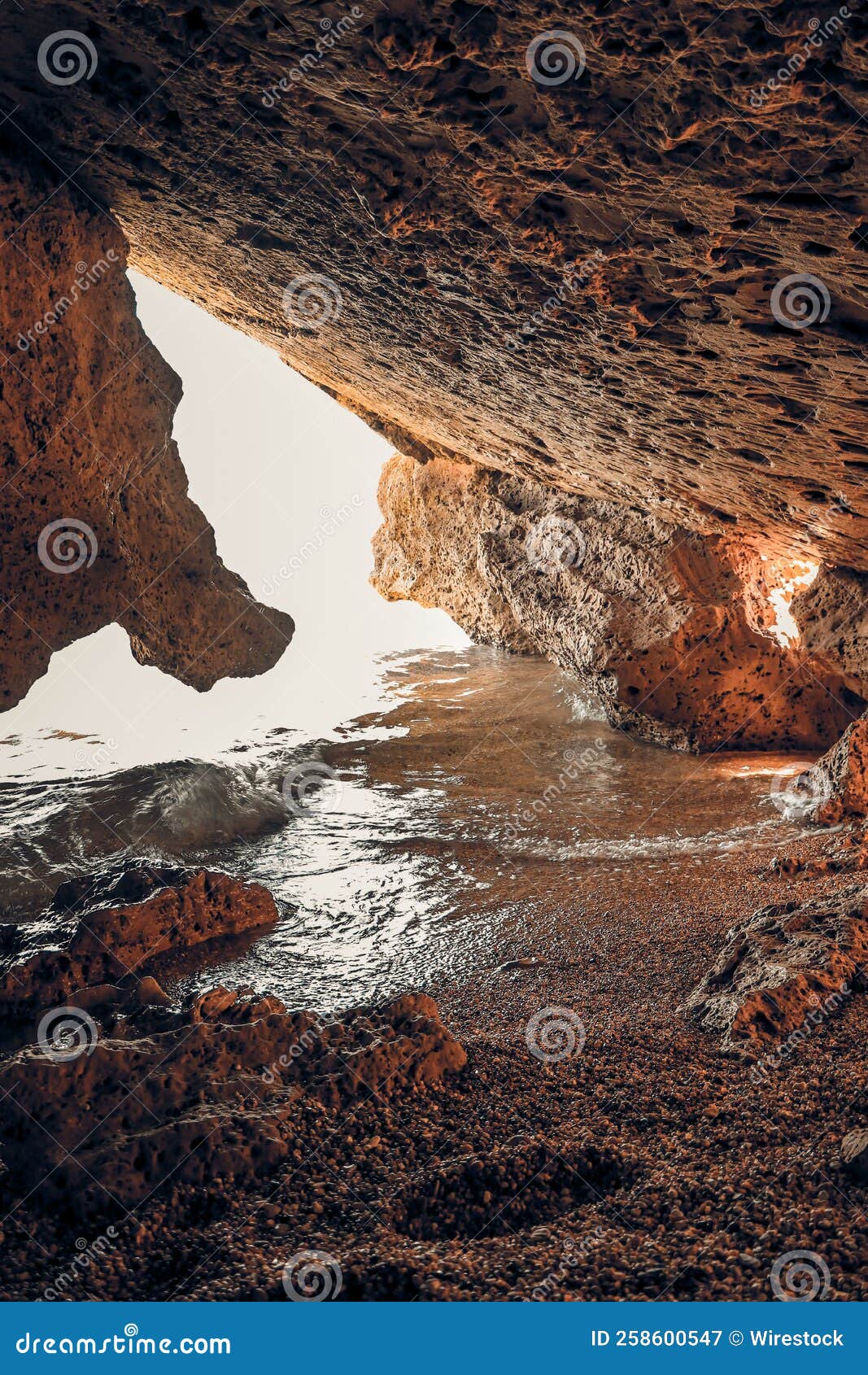 Vertical of Ocean Waves Approaching a Coastal Cave and Rock Formations ...