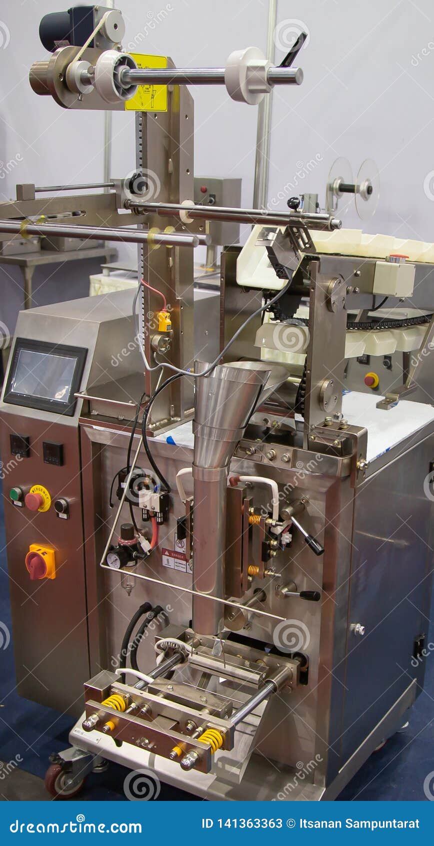 Vertical packing machine stock image. Image of process - 141363363
