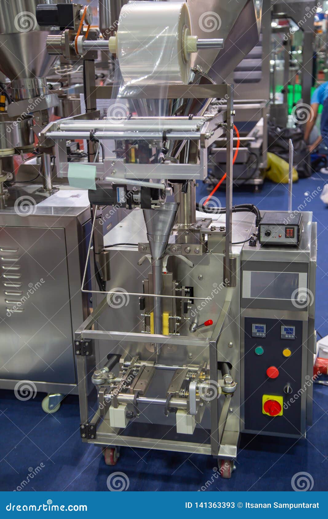 Vertical packing machine stock image. Image of assembly - 141363393