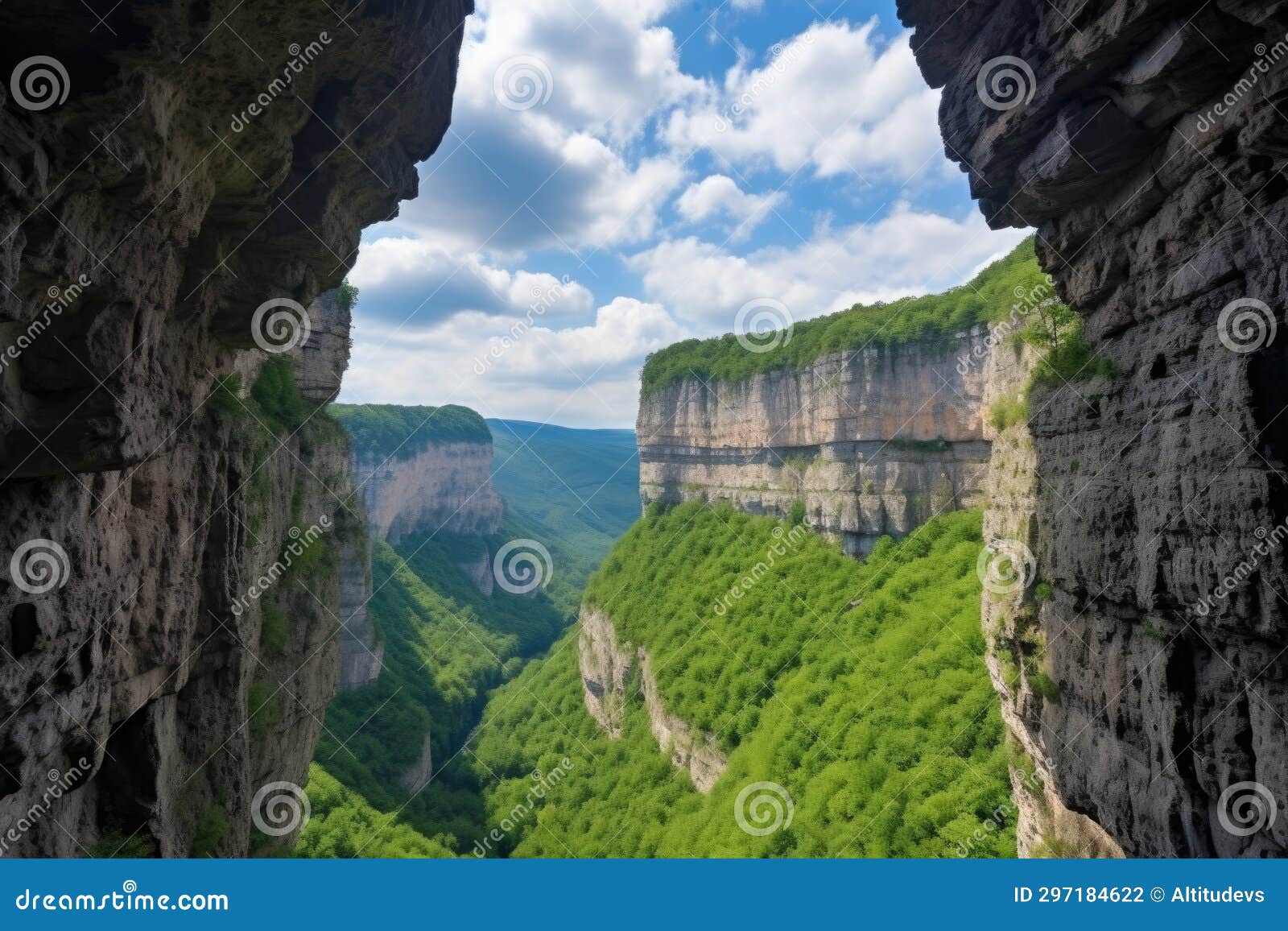 Vertical Panoramic View of a Towering Cliff with Cave Openings Stock ...