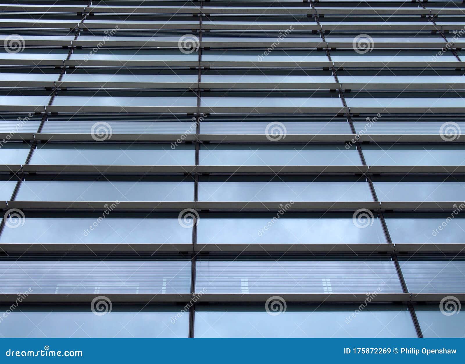 Vertical Perspective View of the Facade of a Modern Glass Commercial ...
