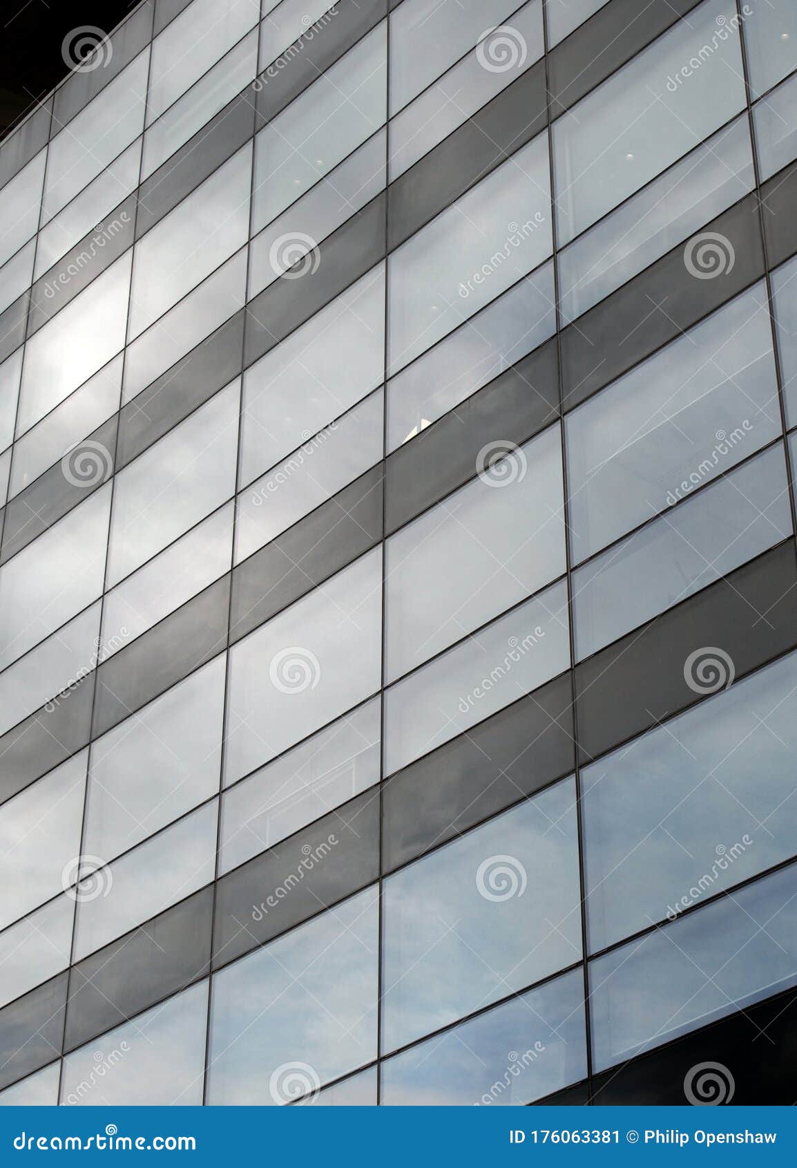 Vertical Perspective View of the Facade of a Modern Glass Commercial ...