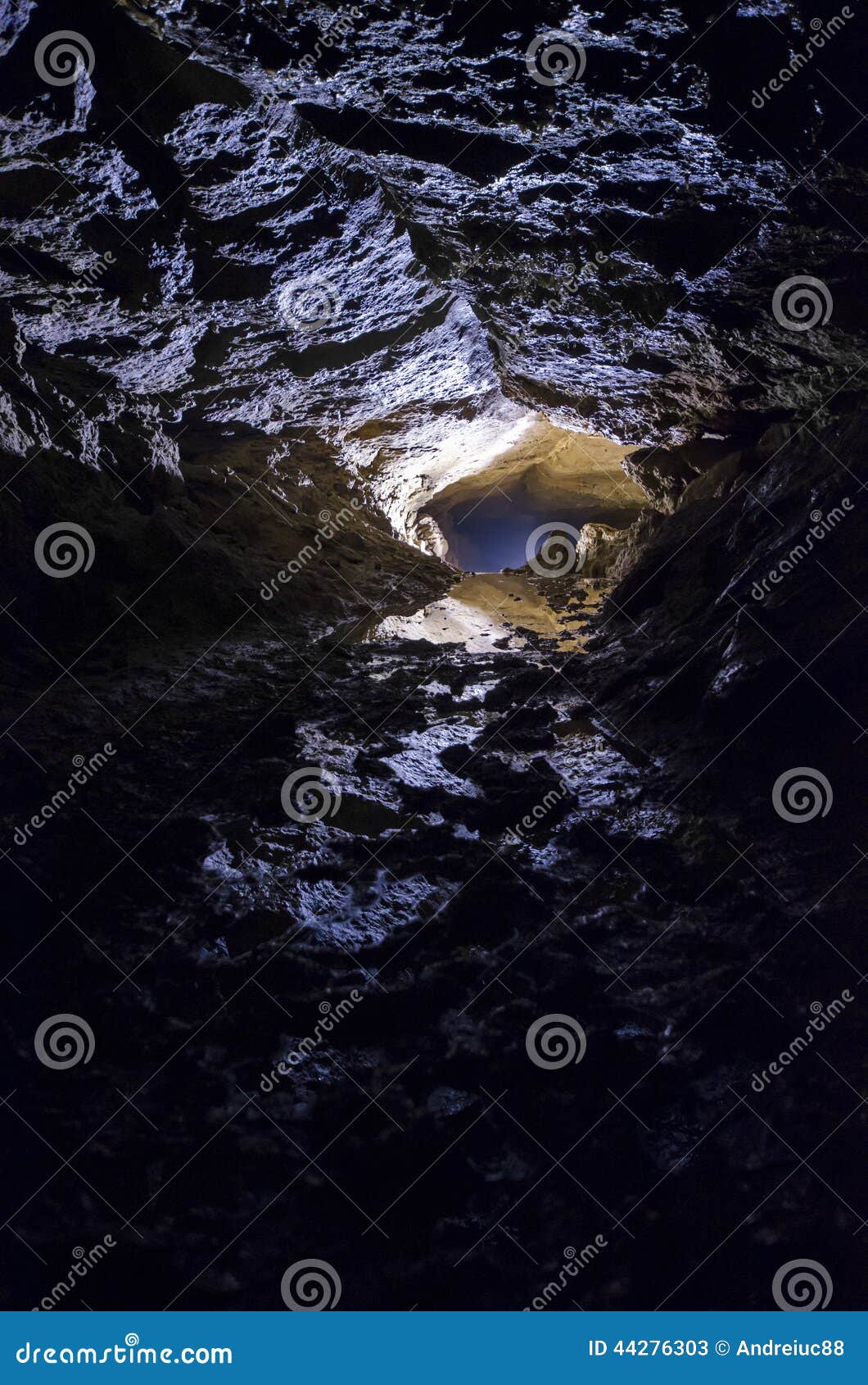 Vertical Photo of Dark Cave with Bright Light Stock Image - Image of ...