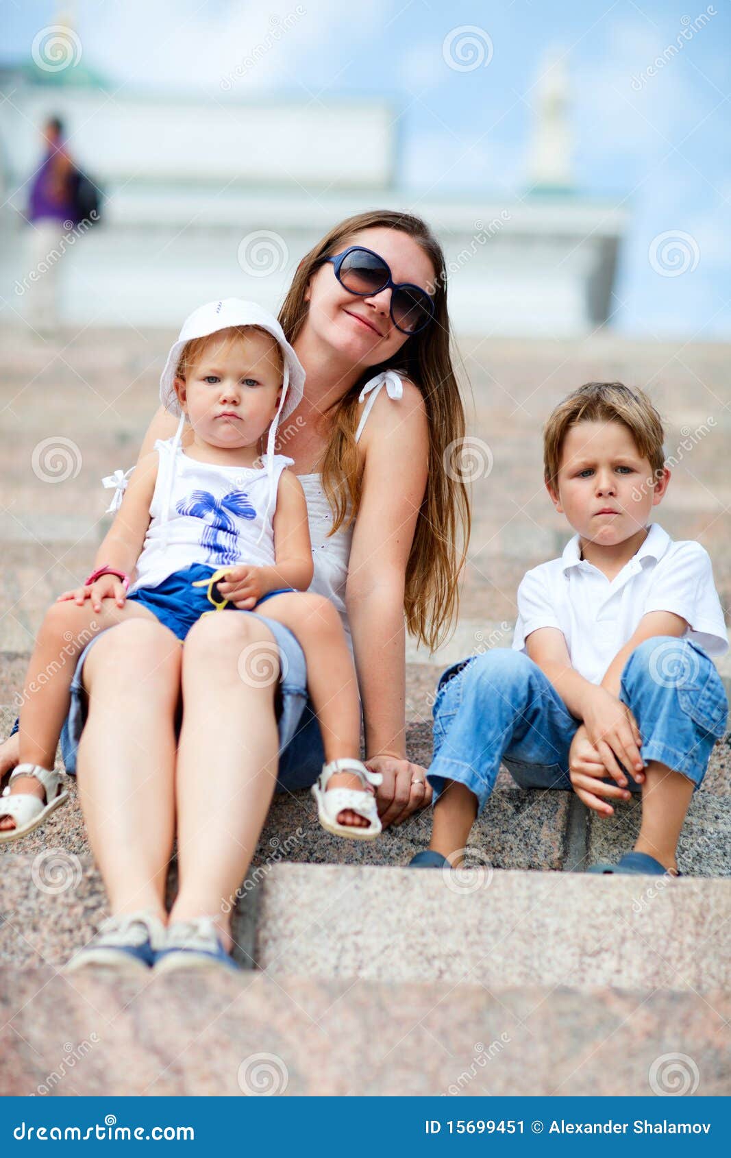 Vertical Photo of Family Sitting on Steps Stock Image - Image of ...
