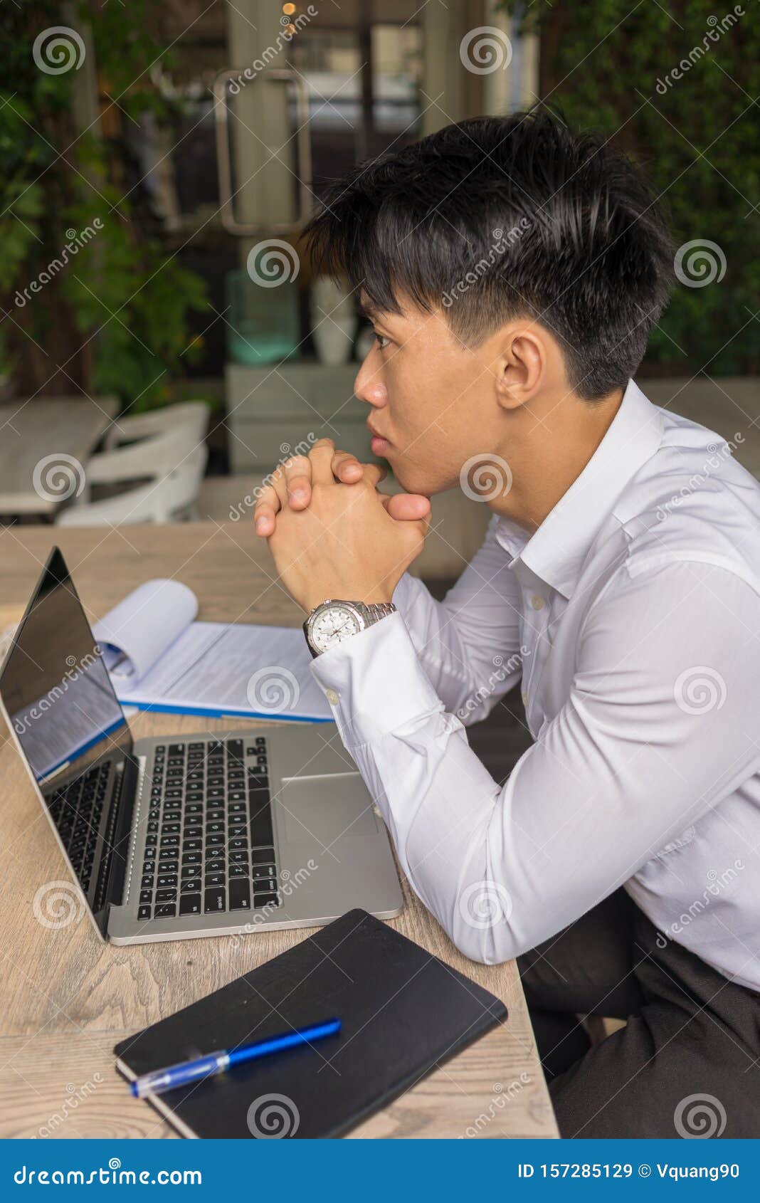 Vertical Photo of Asian Businessman Thinking about Work Stock Image ...