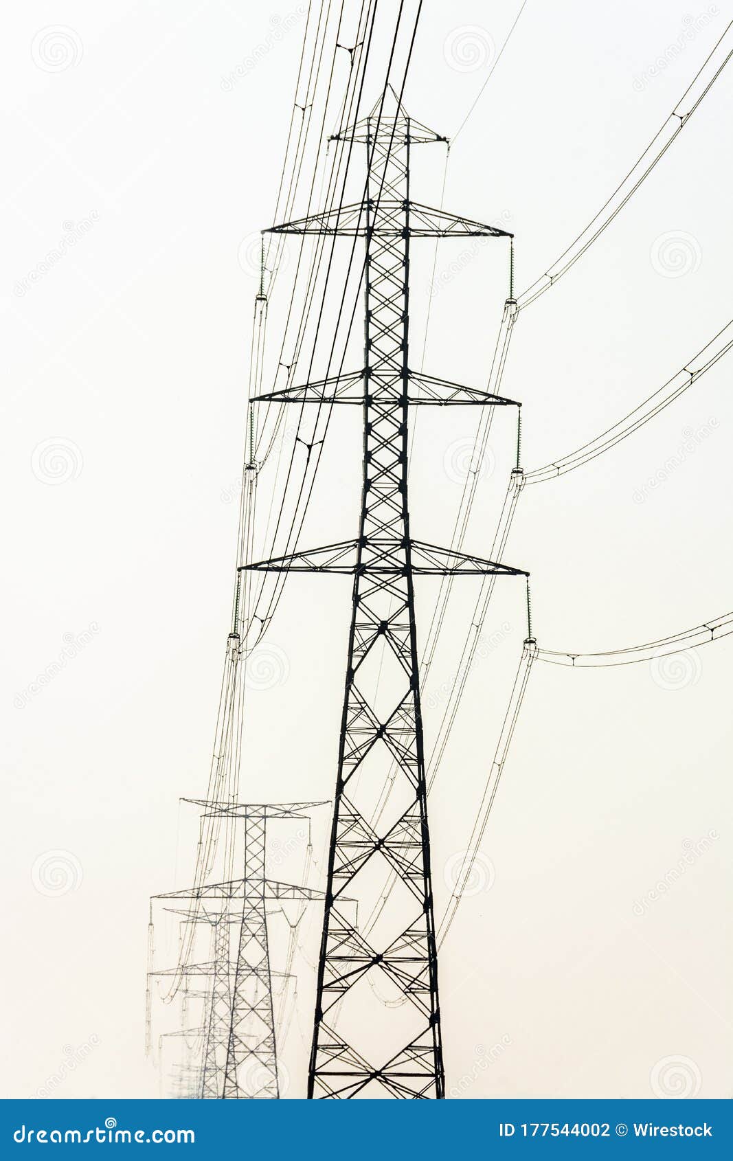 Vertical Picture of Transmission Towers Under the Sunlight at Daytime ...