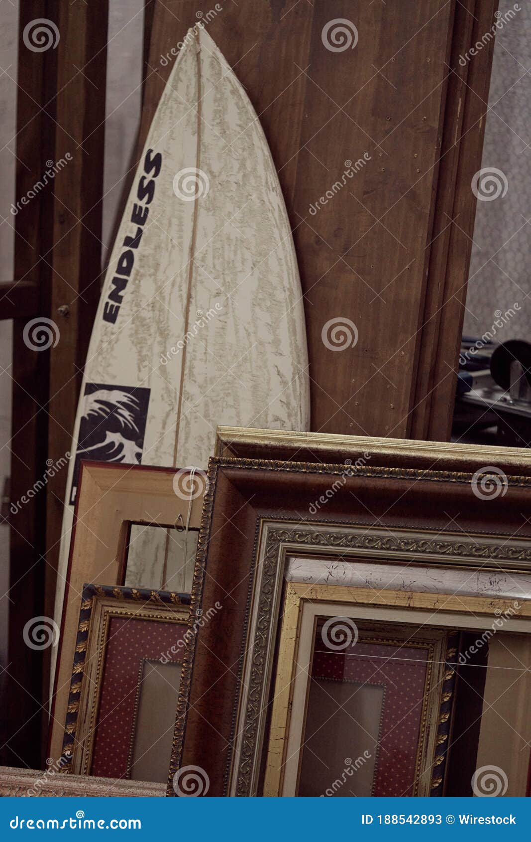 Vertical Picture of Vintage Frames and a White Surfing Board Editorial ...