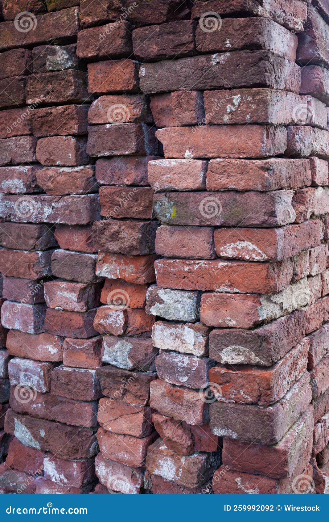 Vertical of a Pile of Old Bricks in Various Colors Stock Photo - Image ...