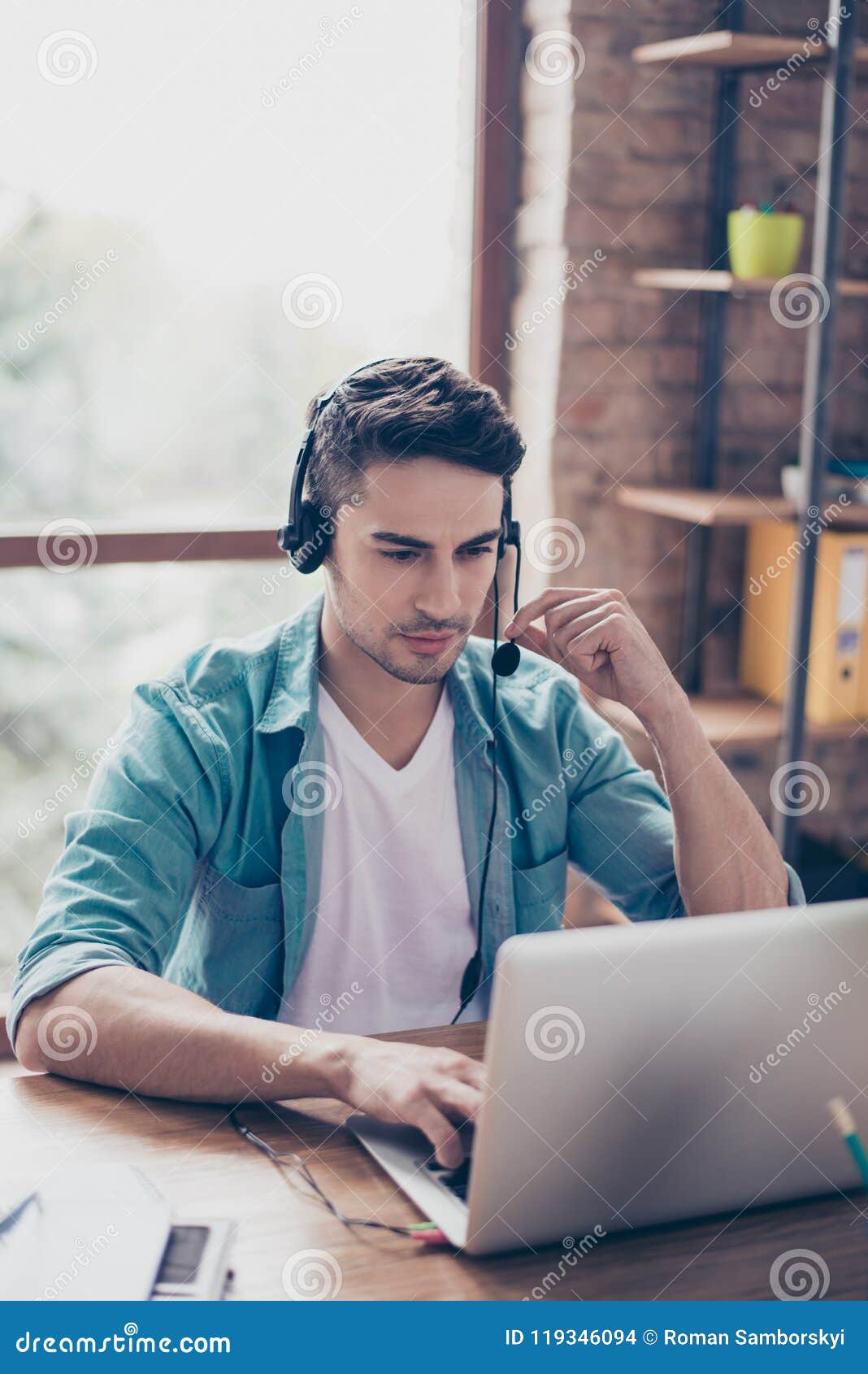 Vertical Portrait of Operator of Call Center Receiving a Call Fr Stock ...