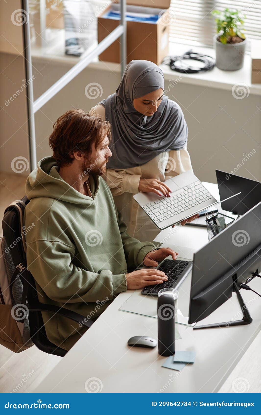 It Team of Two People Reviewing Project in Office Stock Photo - Image ...