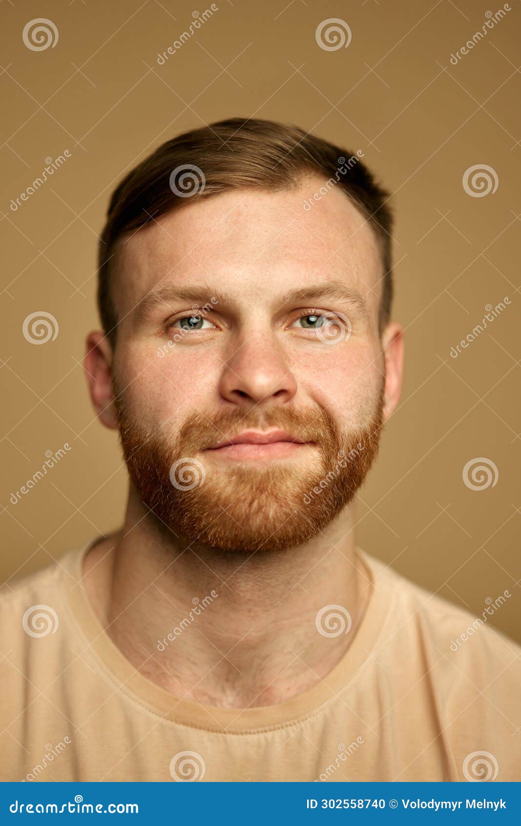 Vertical Portrait Of Young Handsome Redhead Man With Beard Smiling