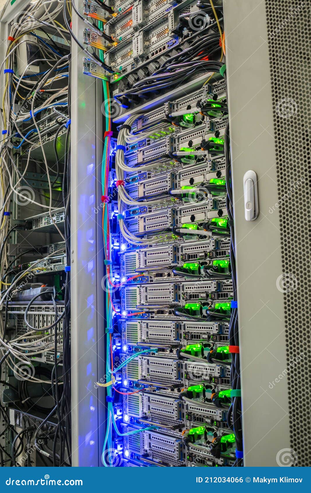 Vertical Racks with Modern Computer Equipment are in the Server Room ...